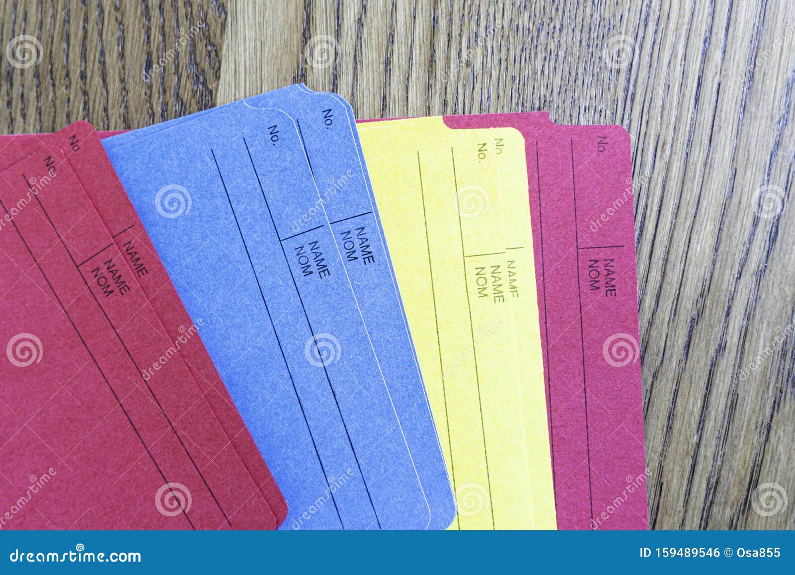 Collection of Multi Colored File Folders on a Table Stock Photo - Image ... Collection of Multi Colored File Folders on a Table Stock Photo - Image ...