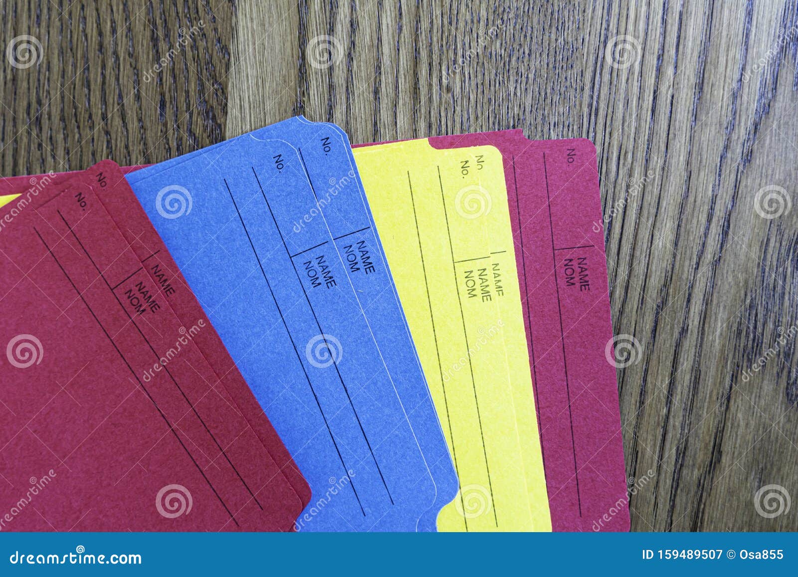 Collection of Multi Colored File Folders on a Table Stock Image - Image ...