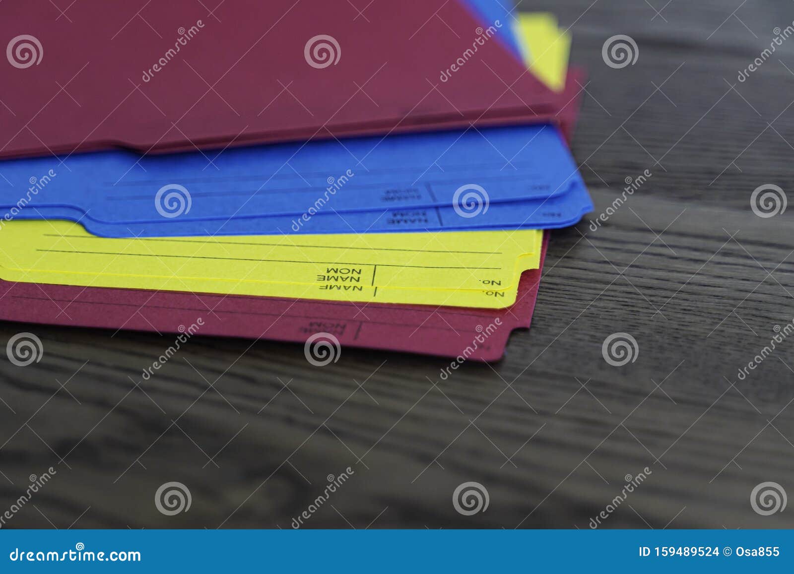 Collection of Multi Colored File Folders on a Table Stock Photo - Image ... Collection of Multi Colored File Folders on a Table Stock Photo - Image ...