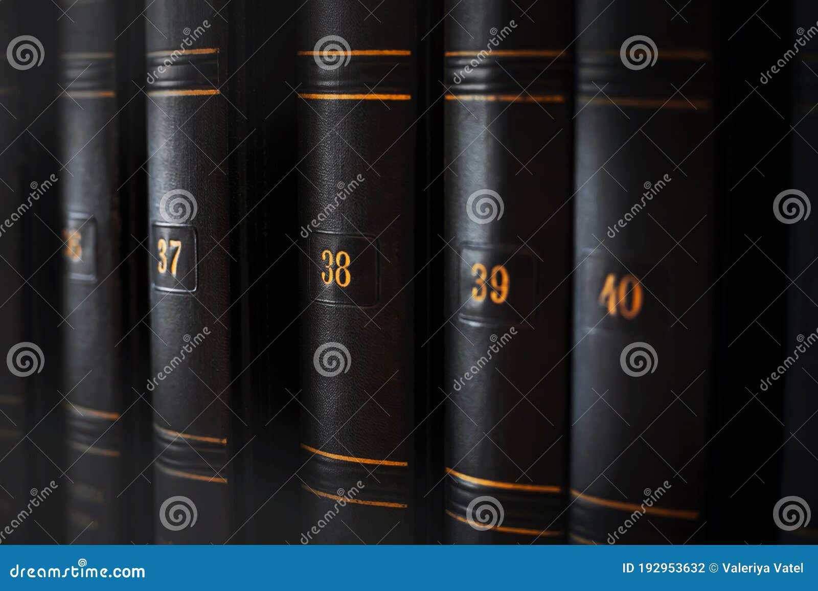 Collection of a Multi-volume Old Encyclopedia in a Dark, Worn Cover ...