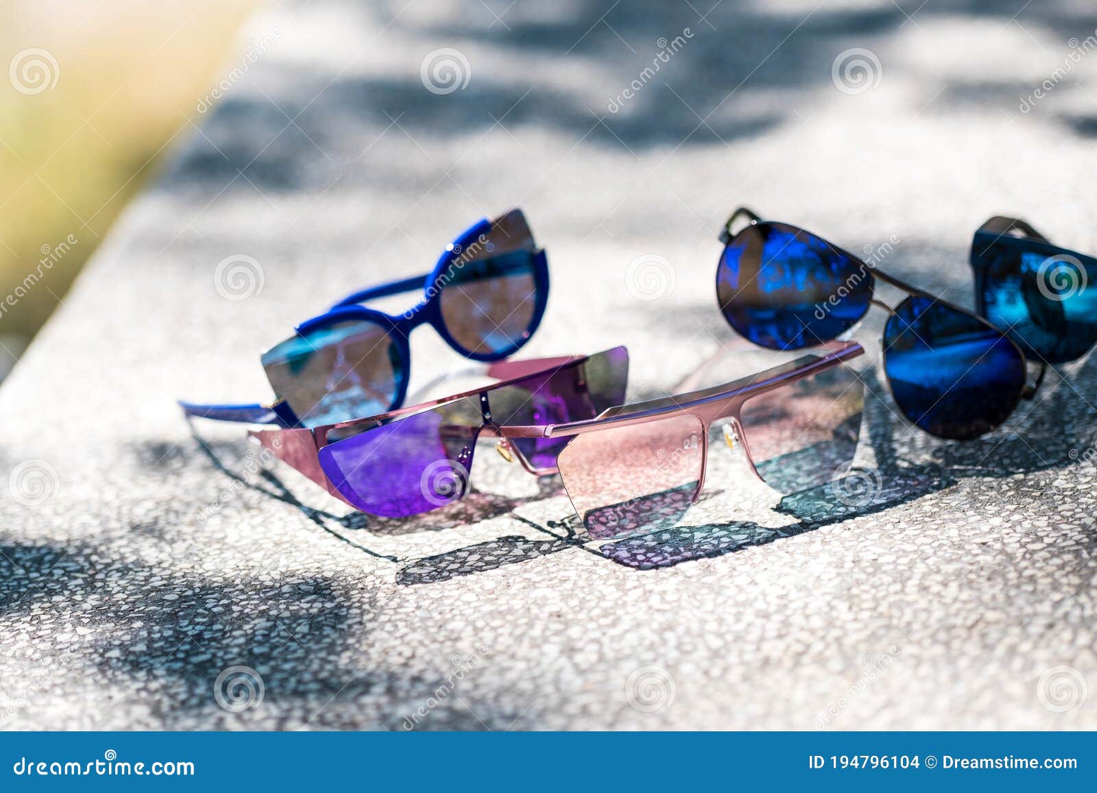 Collection of Multiple Sunglasses Models for Men and Women Stay on a ...