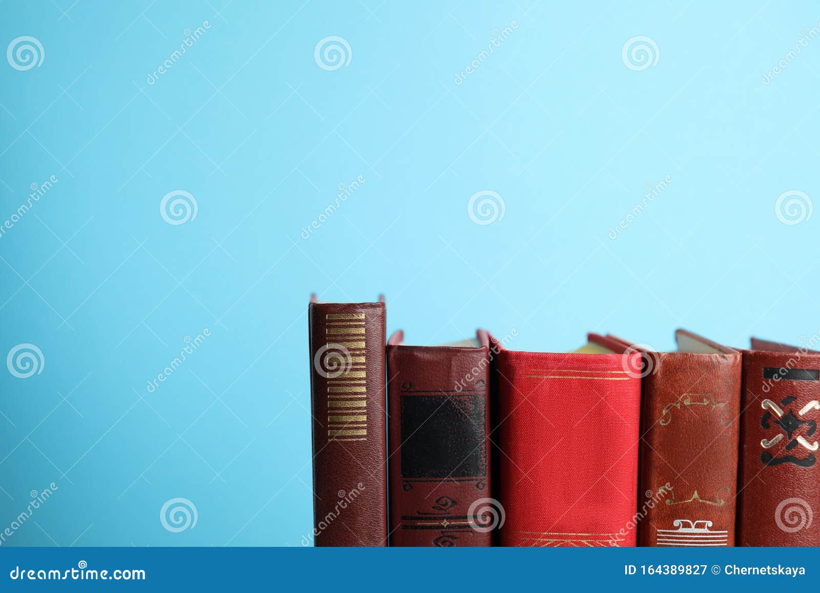 Collection of Old Books on Light Blue Background Stock Image - Image of ...