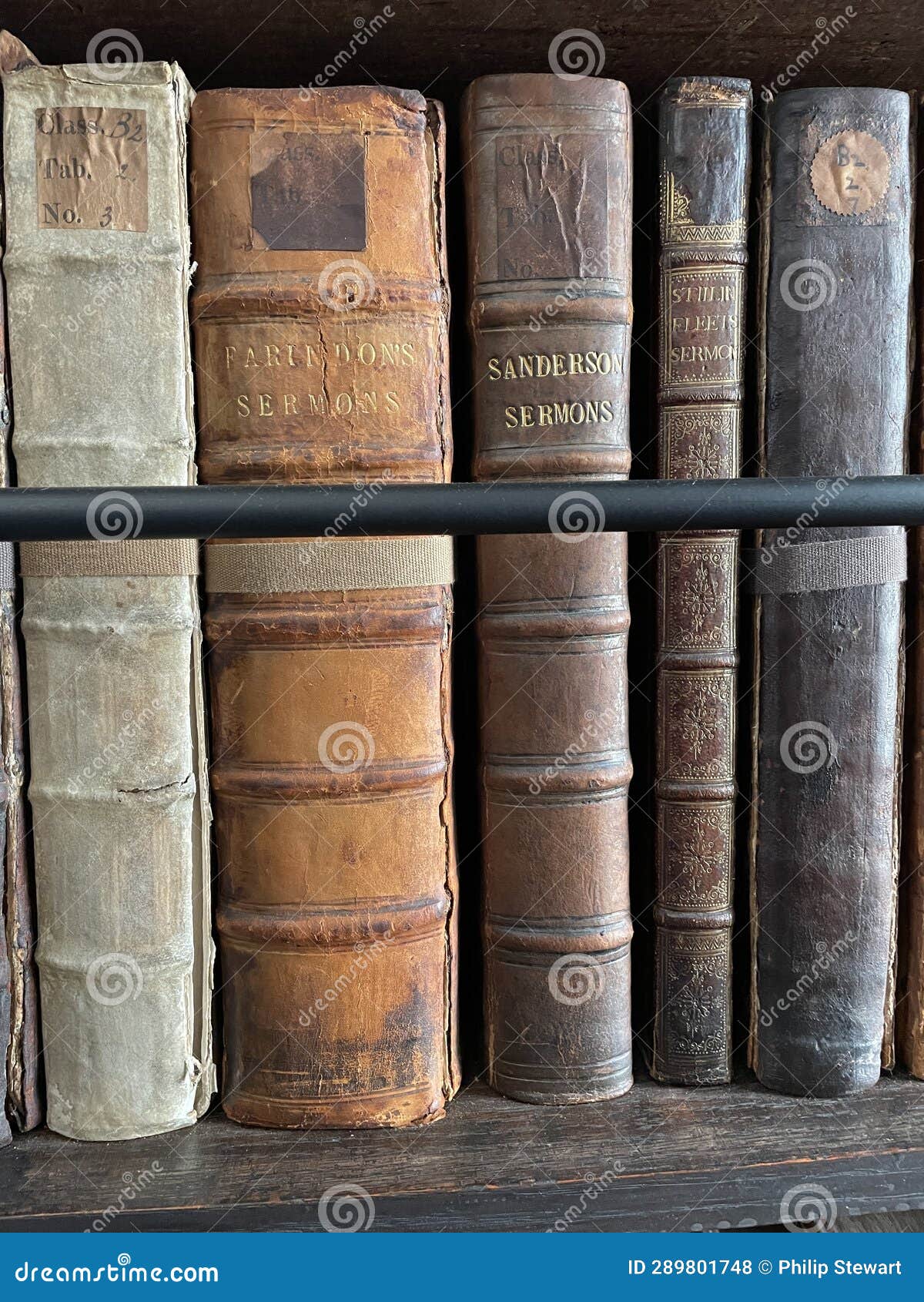 Old books on a shelf stock photo. Image of library, background - 289801748