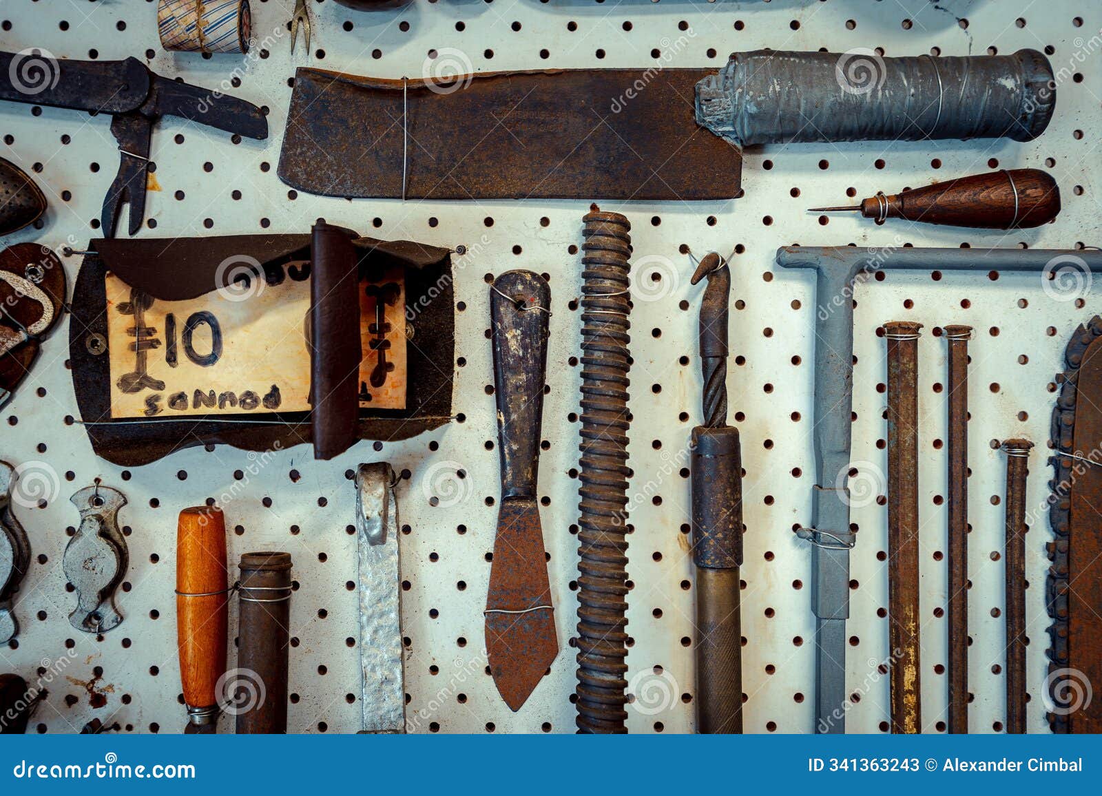 A Collection of Old Hand Tools Arranged on the Wall Stock Image - Image ...