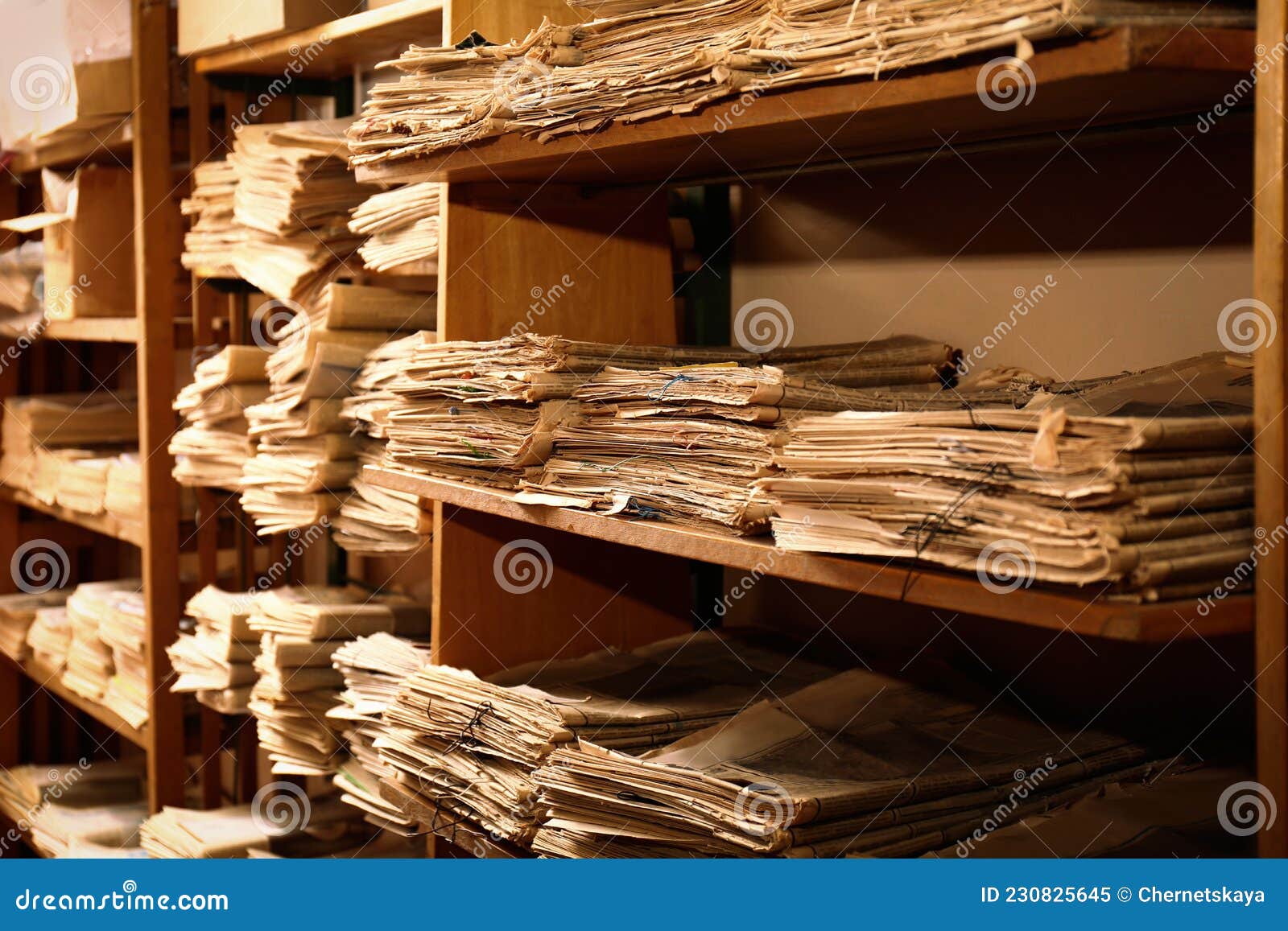 Collection of Old Newspapers on Shelves in Library Stock Image - Image ...