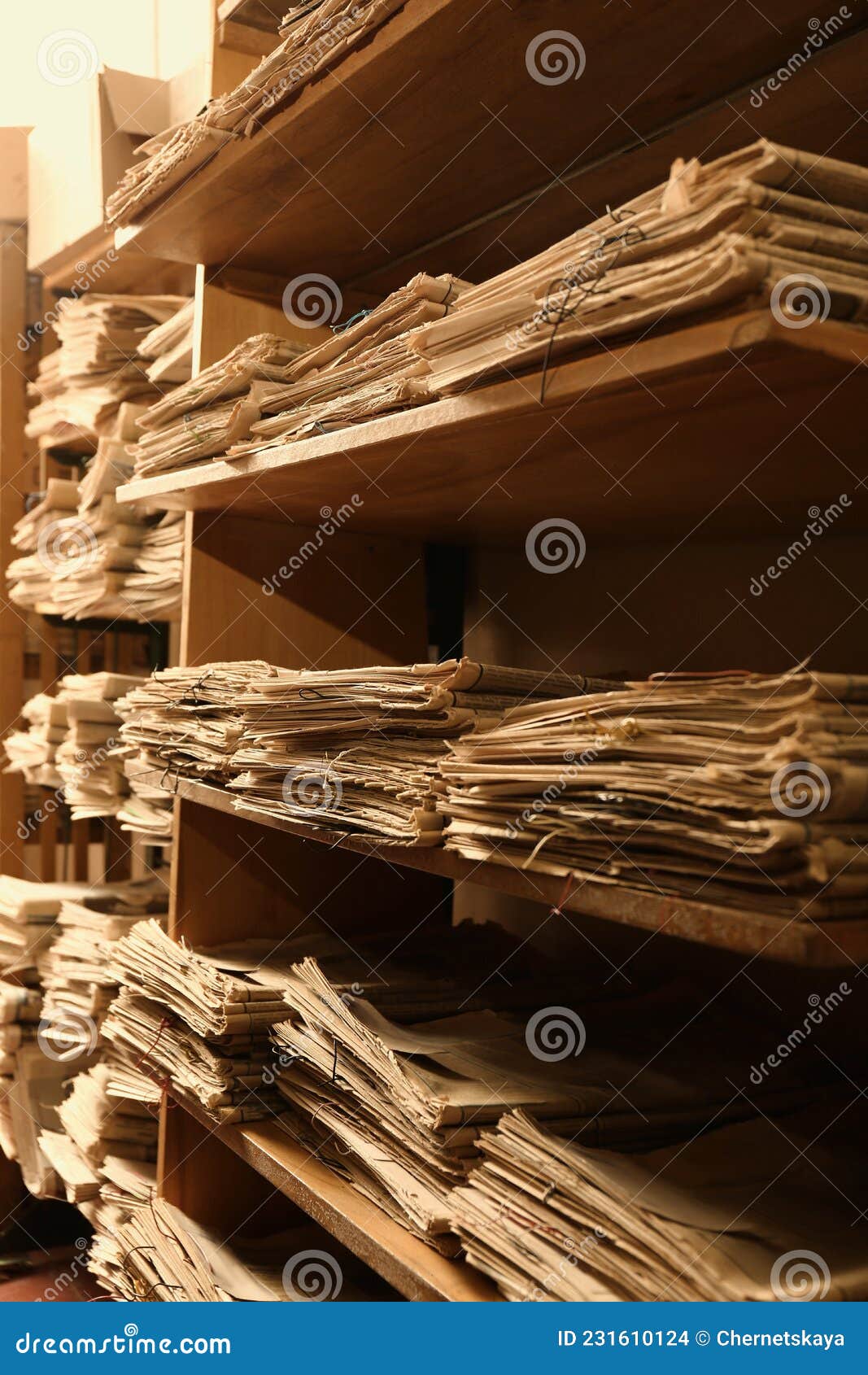 Collection of Old Newspapers on Shelves in Library Stock Photo - Image ...