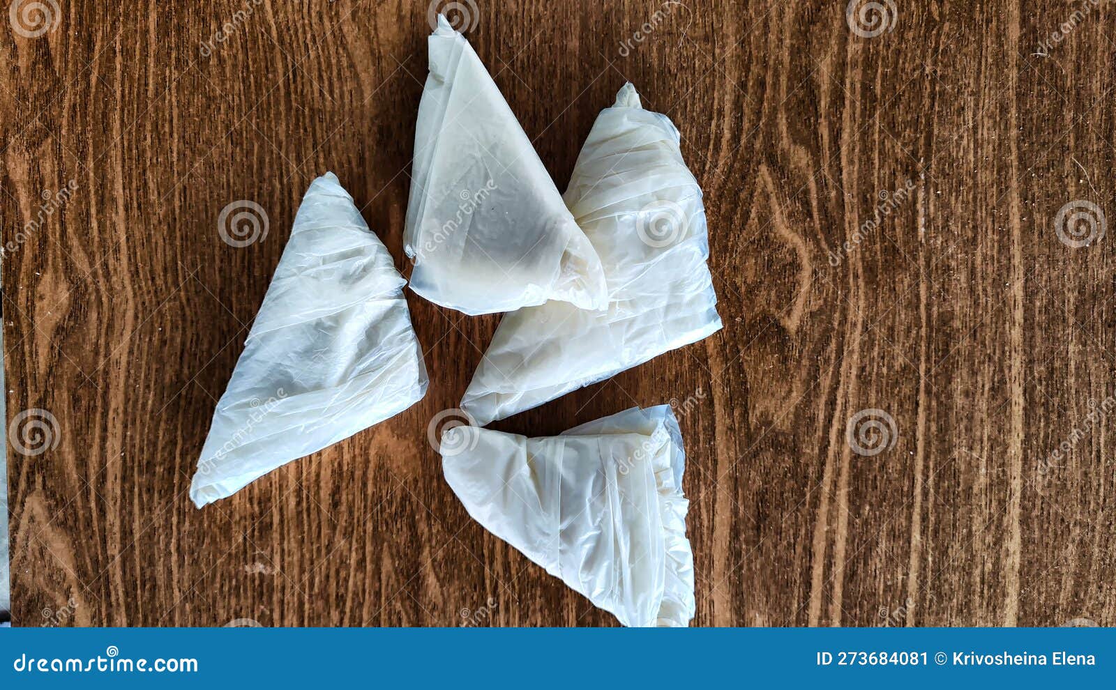 Collection of Plastic Bags Folded in a Triangle. Pile of Plastic Bags ...