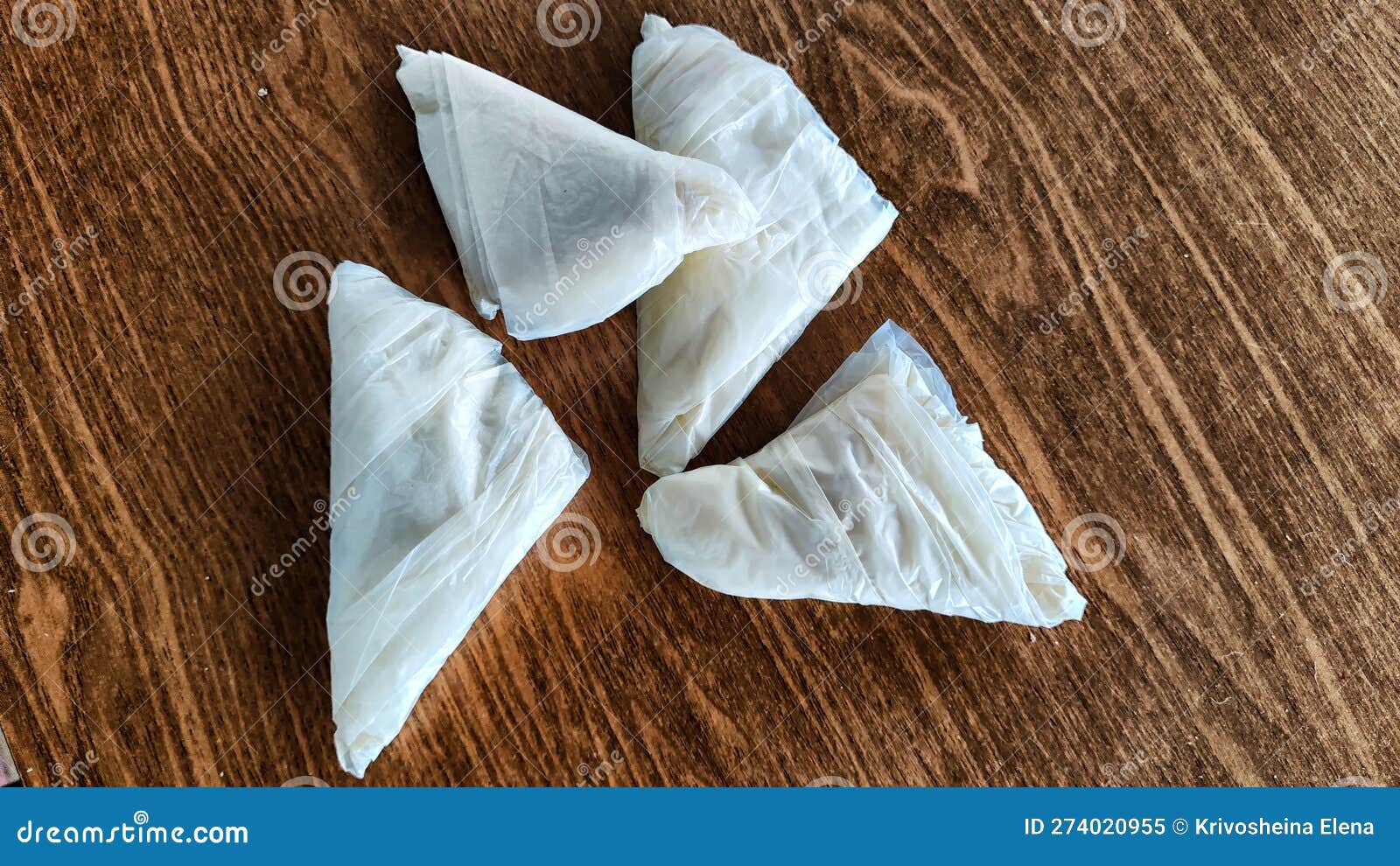 Collection of Plastic Bags Folded in a Triangle. Pile of Plastic Bags ...