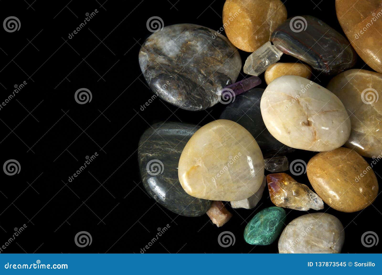 Collection of Polished Stones on Black Background Stock Image - Image ...