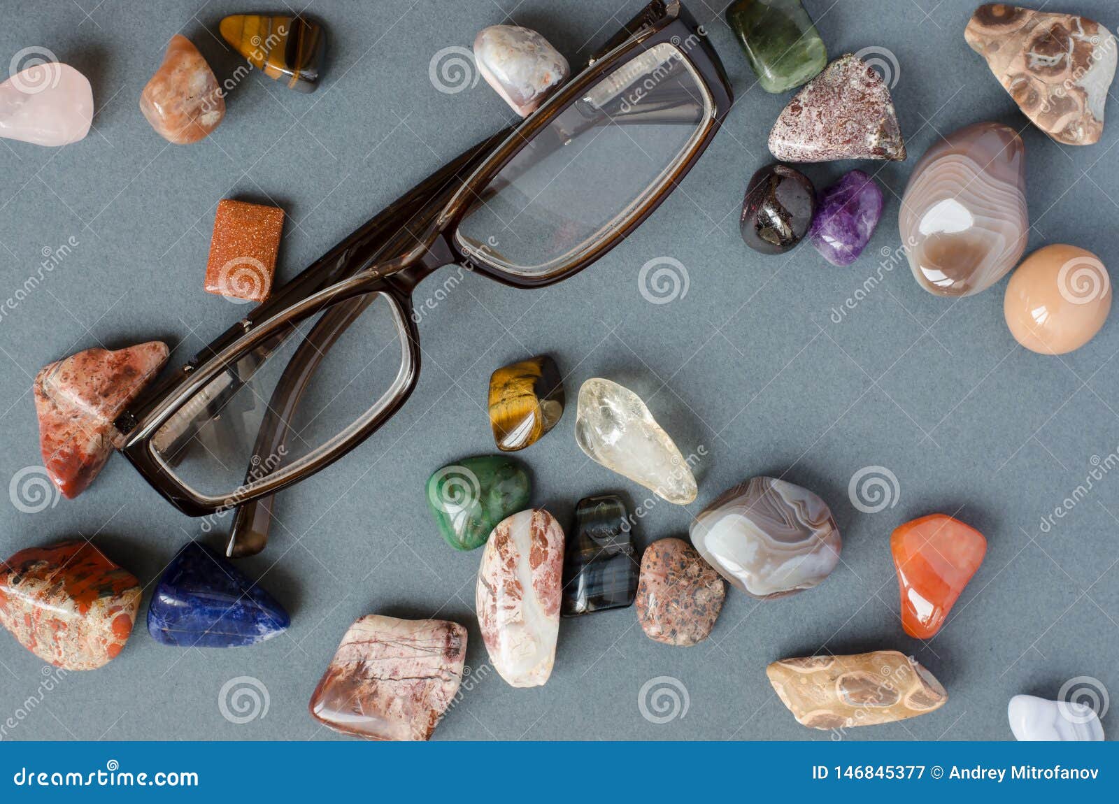Collection of Precious Stones on a Gray Background Stock Image - Image ...