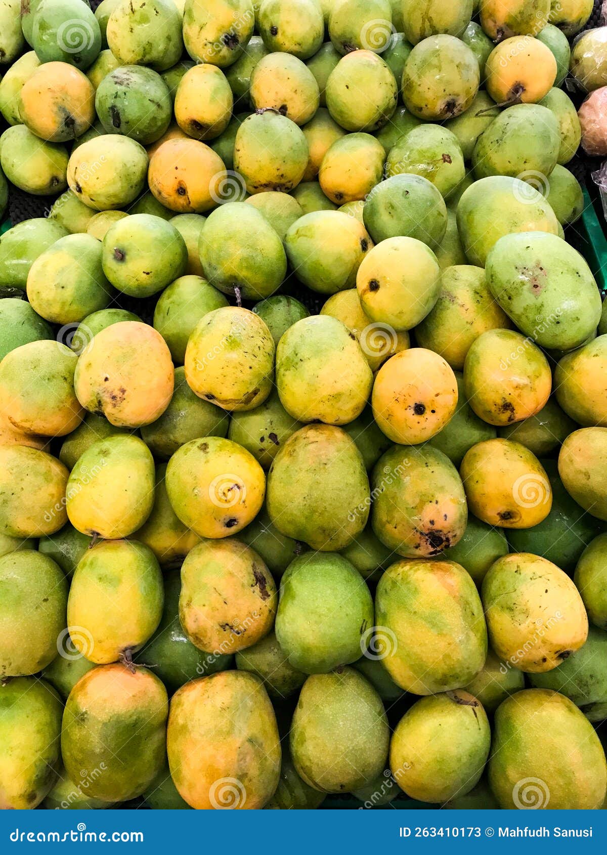 A Collection of Ripe Mangoes on Display at the Market Stock Image ...