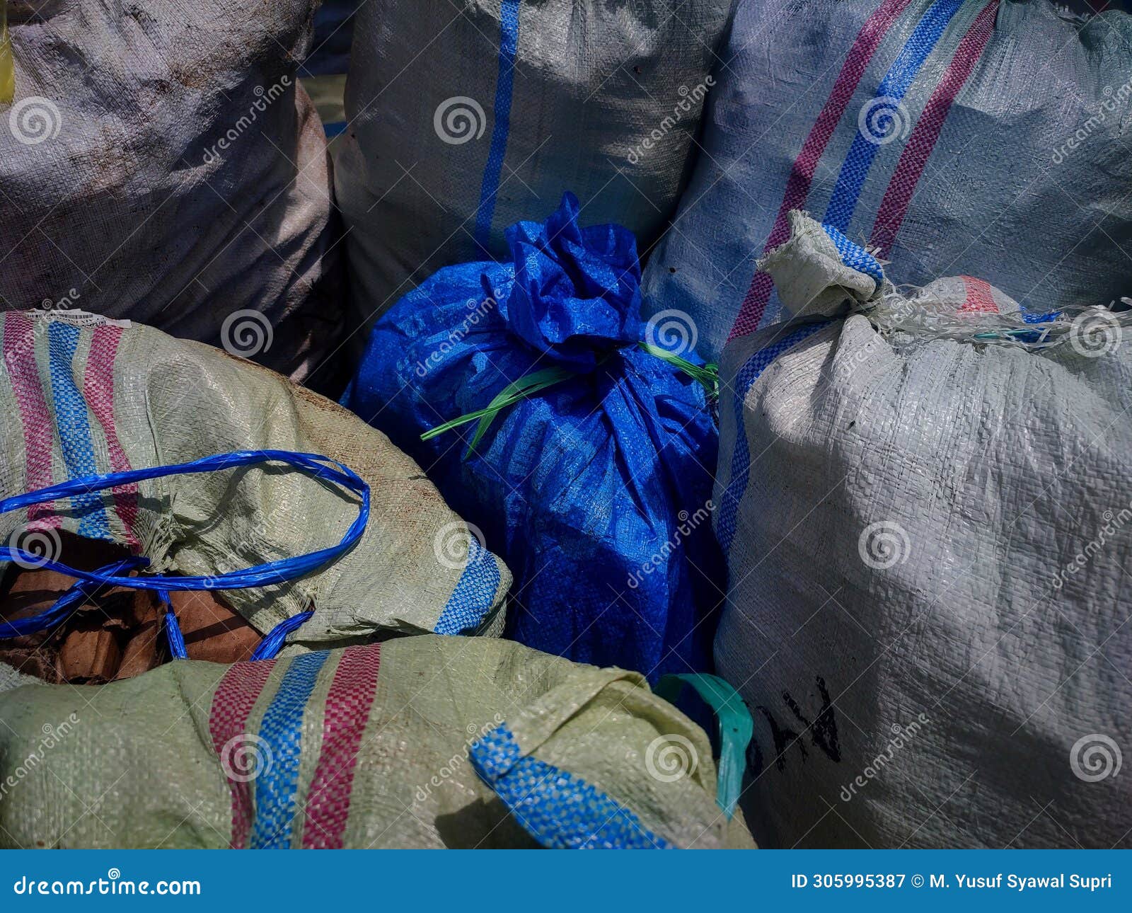 A Collection of Sacks Filled with Rubbish Stock Image - Image of ...