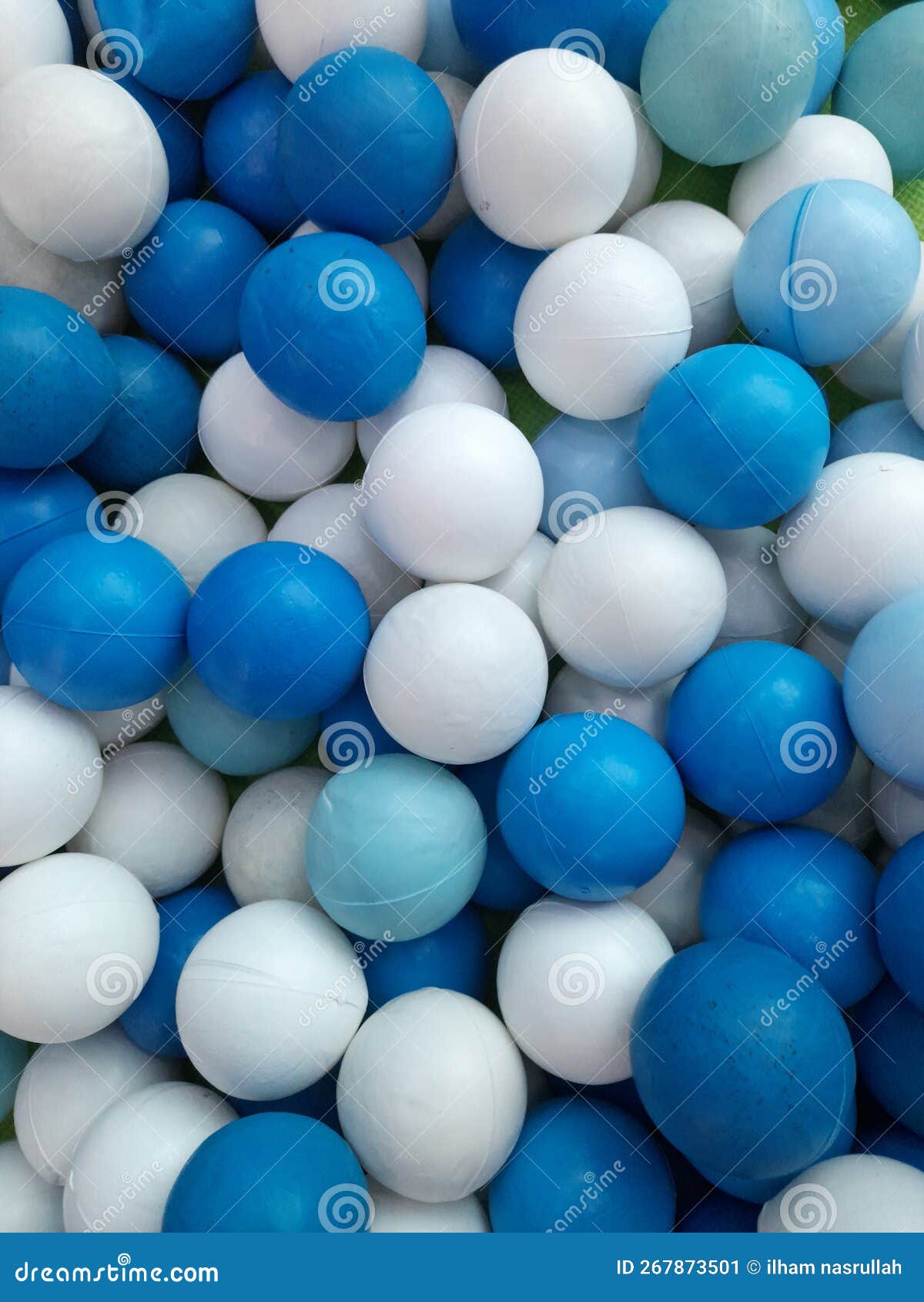 A Collection of Small White Balls Blue Stock Image - Image of glass ...