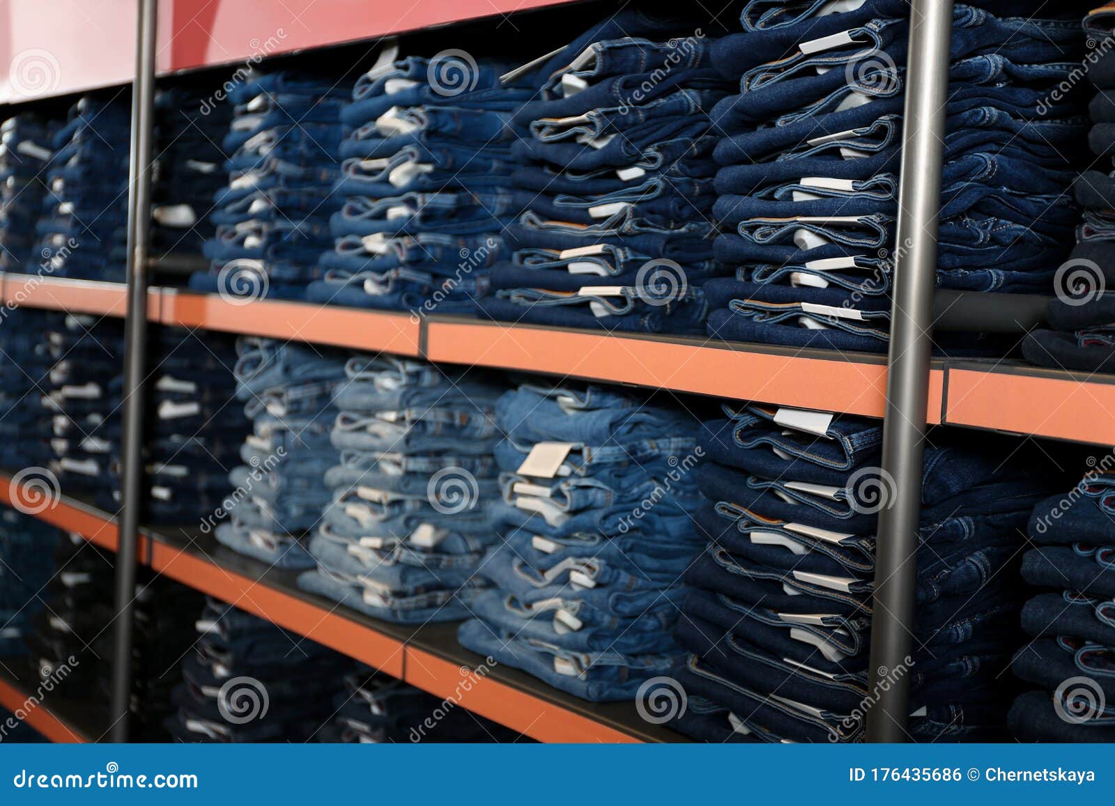 Collection of Jeans on Shelves in Shop Stock Photo - Image of boutique ...