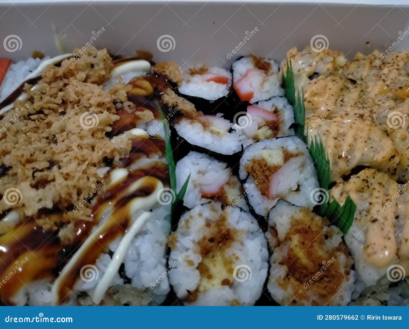A Collection of Sushi with Various Kinds of Toppings Stock Photo ...