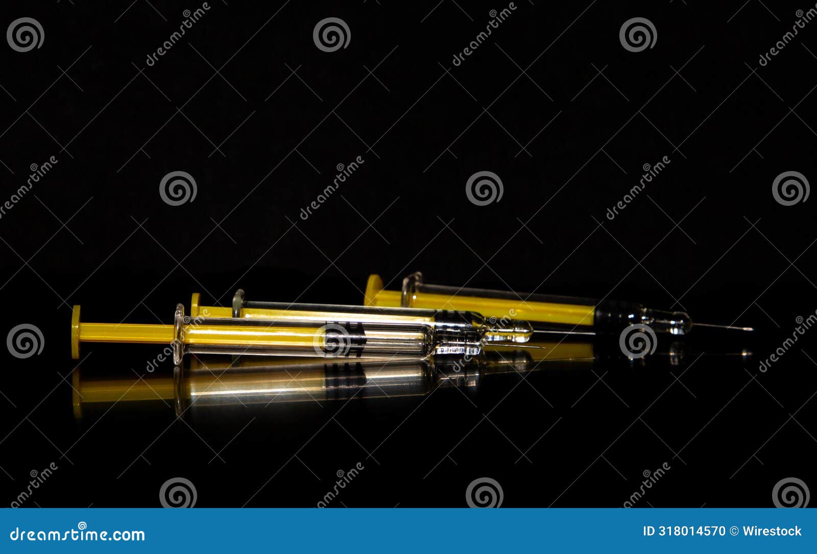 Collection of Syringes on a Dark Background. Stock Photo - Image of ...