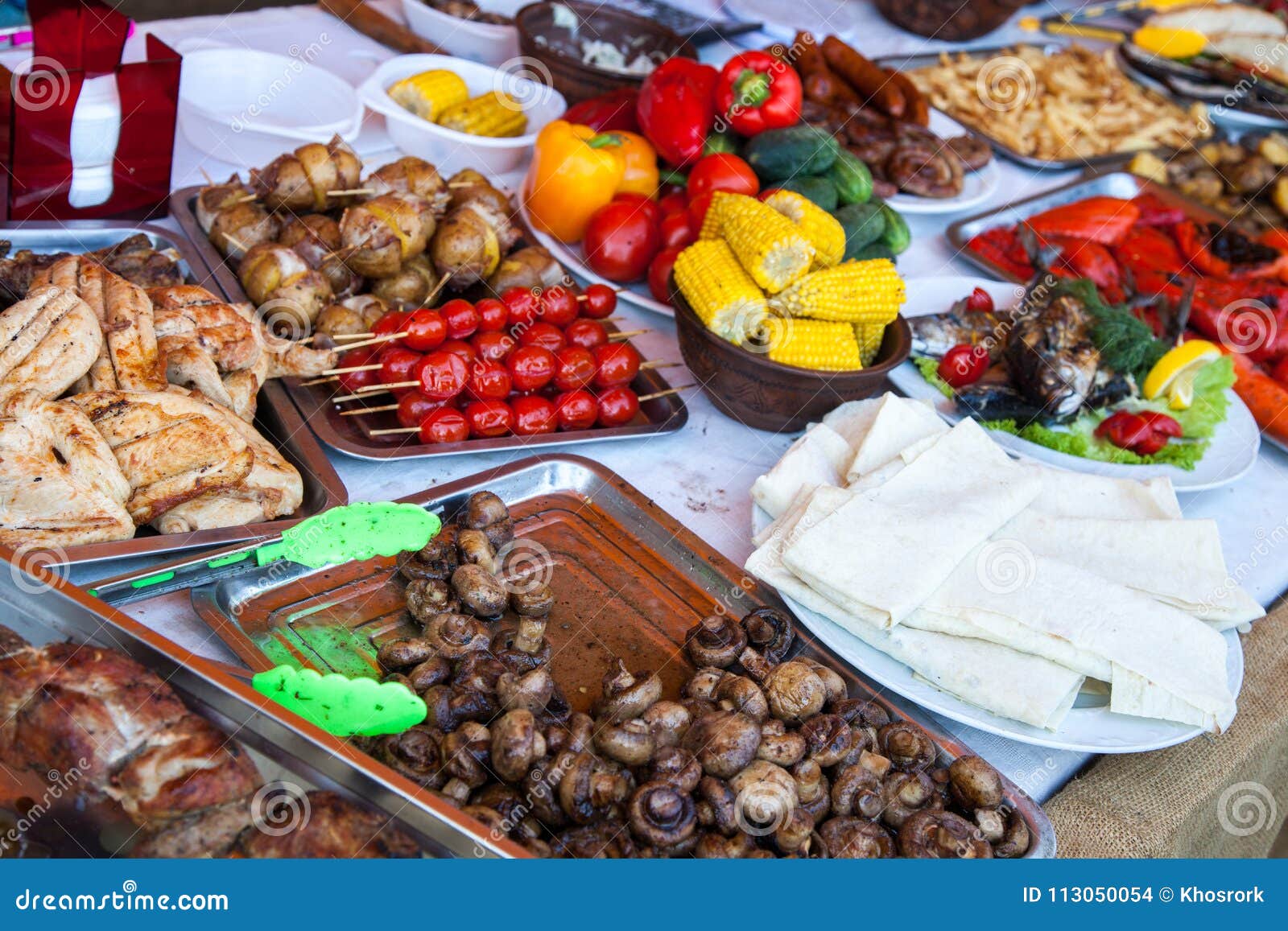 Collection of Tasty Dishes on Table Stock Photo - Image of seasoned ...