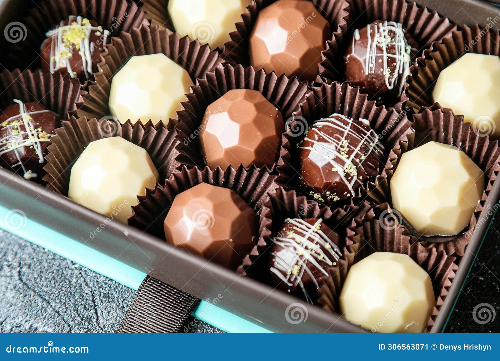 Assorted Chocolates Filling a Box on a Table Stock Image - Image of ...