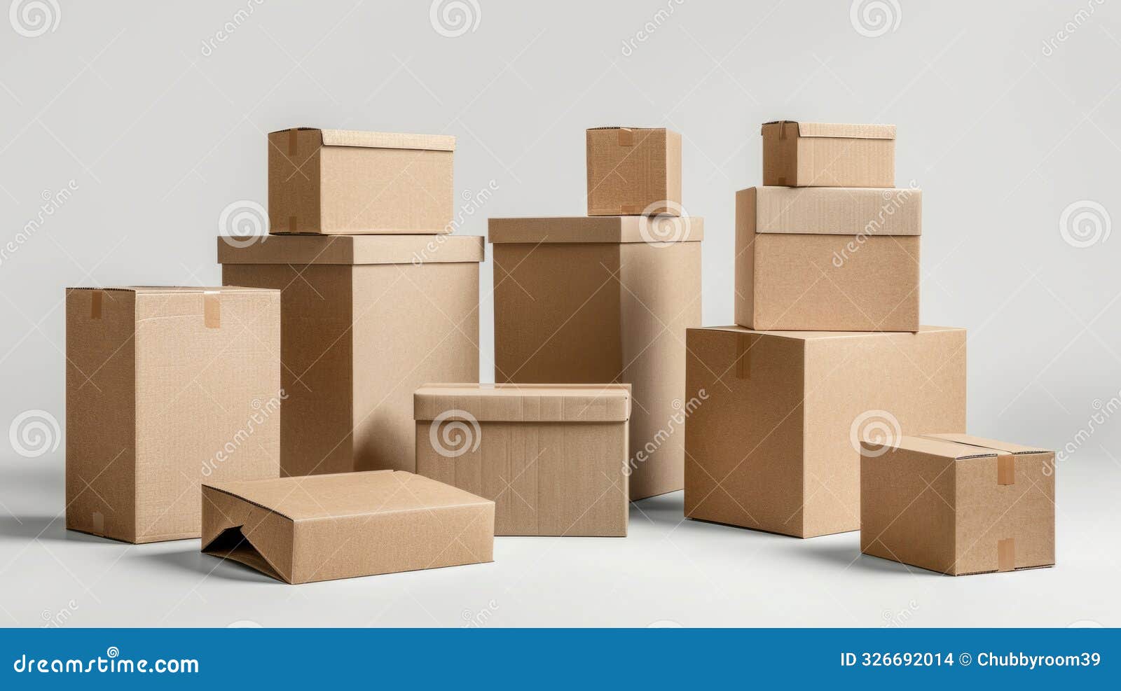 A Collection of Various Sized Cardboard Boxes Stacked Unevenly on a ...