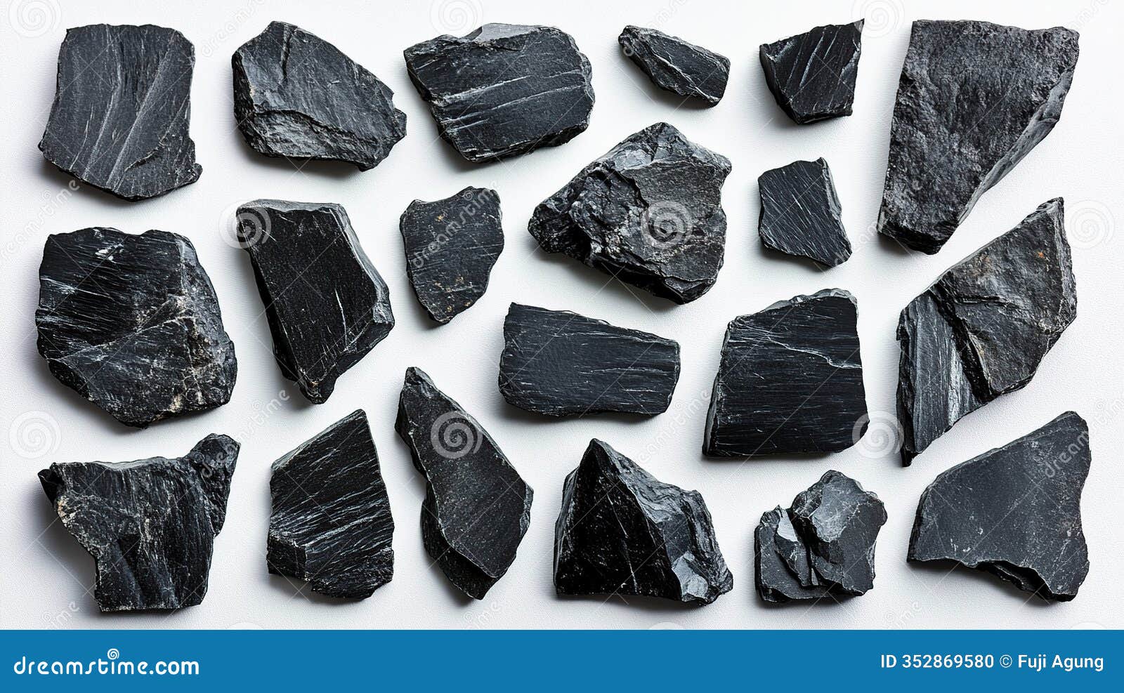 Collection of Various Sizes and Shapes of Dark Grey Slate Stones on ...
