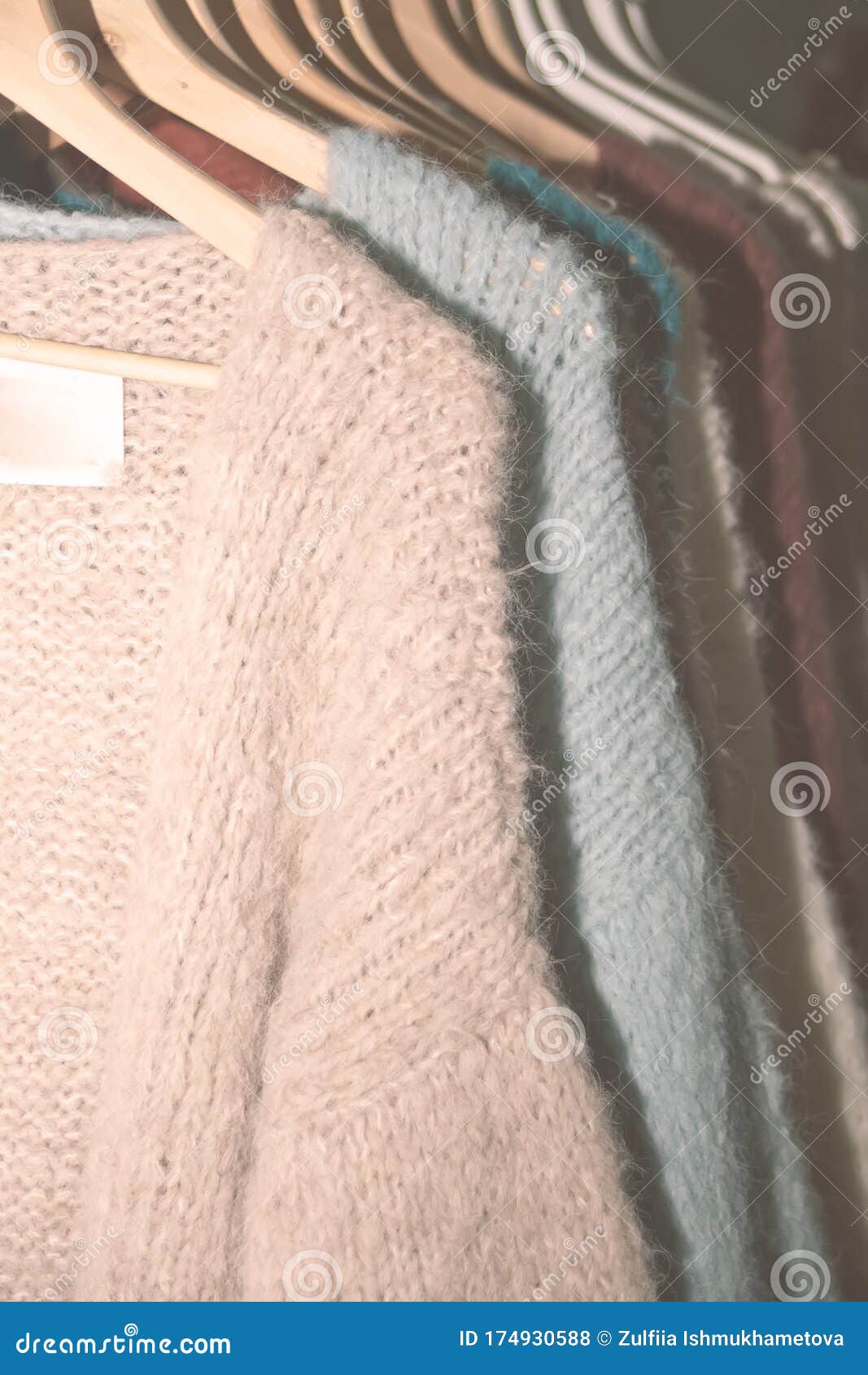 Collection of Warm Womans Sweaters Hanging on Rack Stock Photo - Image ...
