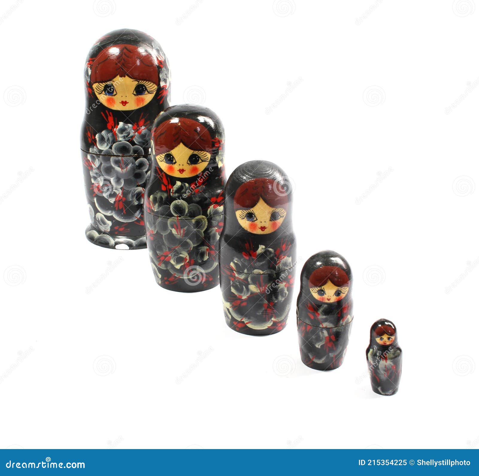Collection of Wooden Nesting Stacking Dolls on White Background Stock ...