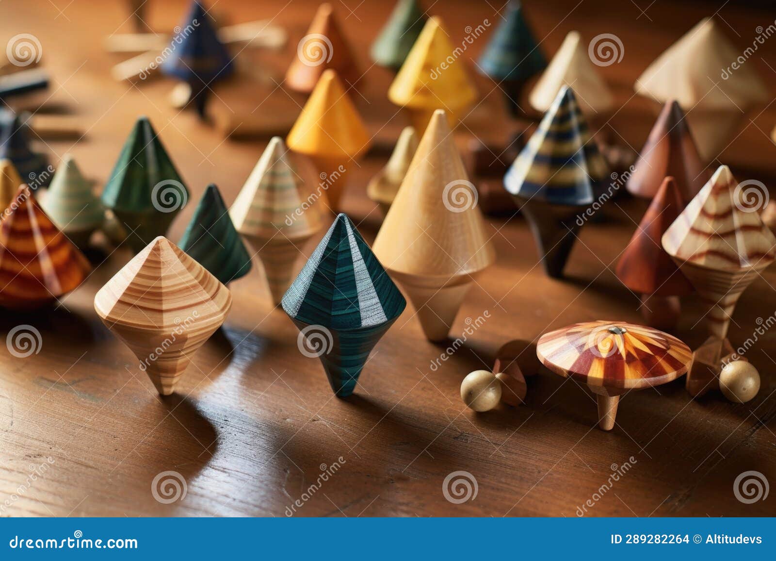 Collection of Wooden Spinning Tops on Wooden Surface Stock Photo ...