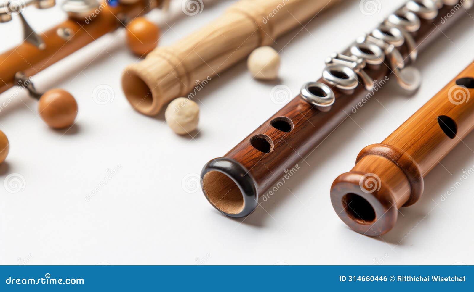 A Collection of Woodwind Instruments, Including Flutes and Recorders ...