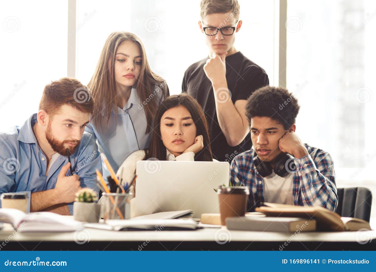 College Classmates Doing Group Project at Library Using Laptop Stock ...