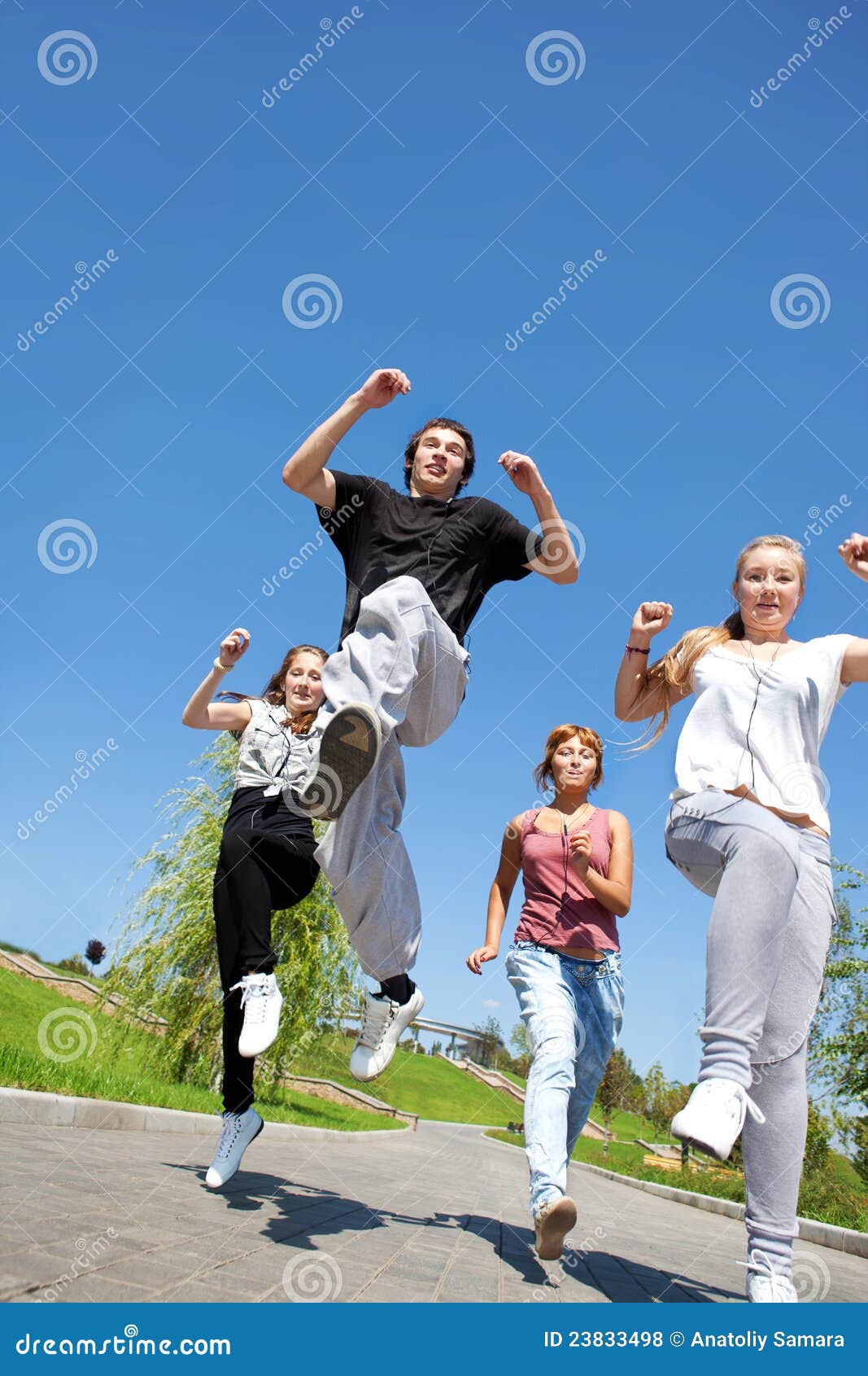 College friends running stock photo. Image of outside - 23833498
