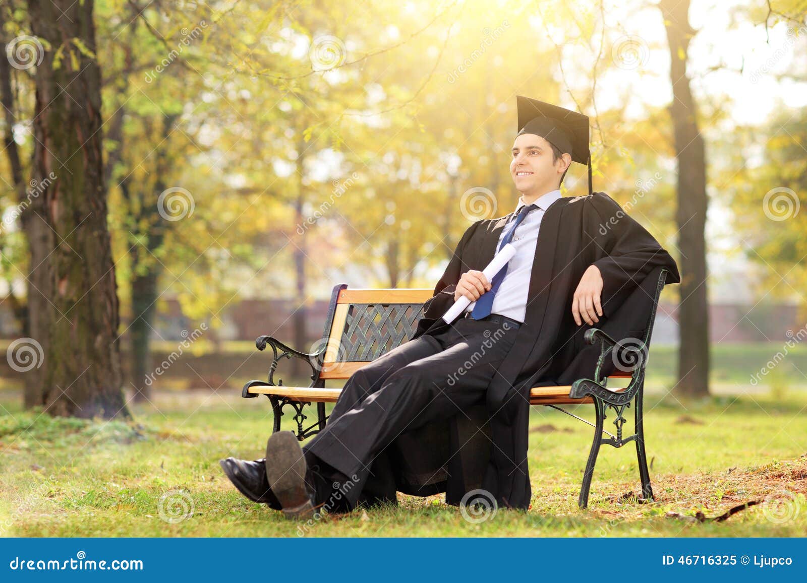 College Graduate Enjoying in Park Stock Image - Image of hold, park ...
