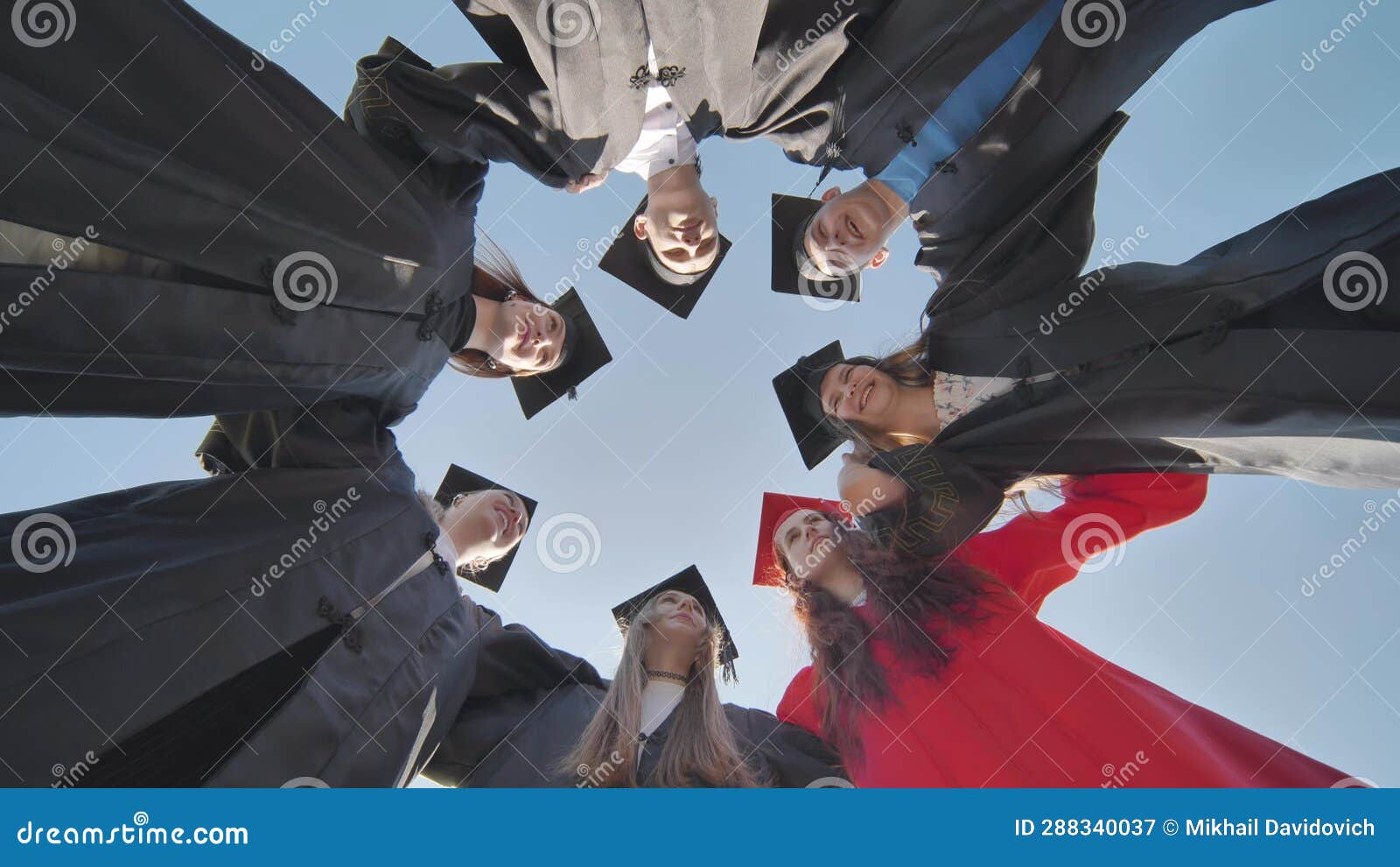 College Graduates in a Circle Stand Hugging Each Other. Stock Video ...