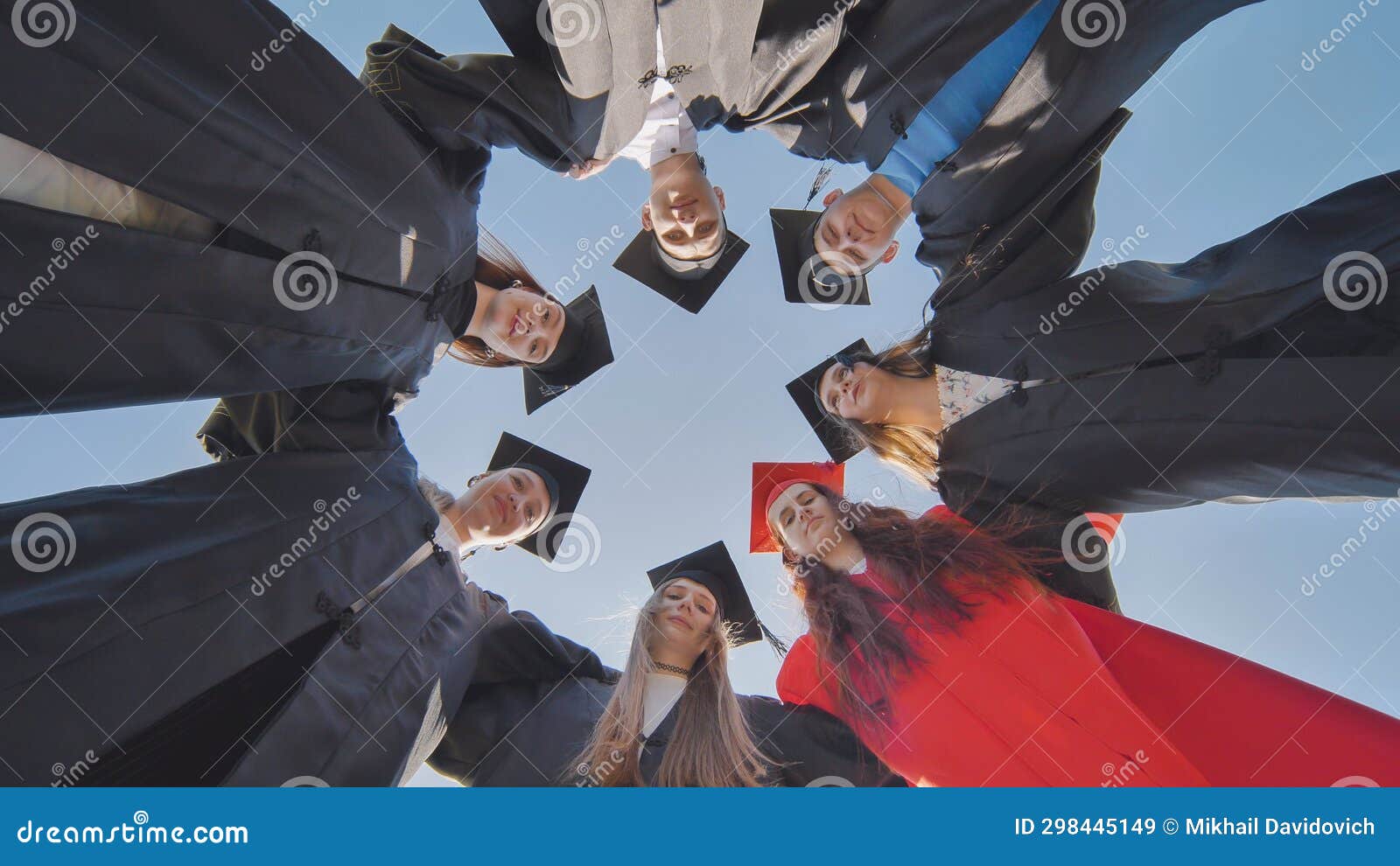 College Graduates in a Circle Stand Hugging Each Other. Stock Image ...