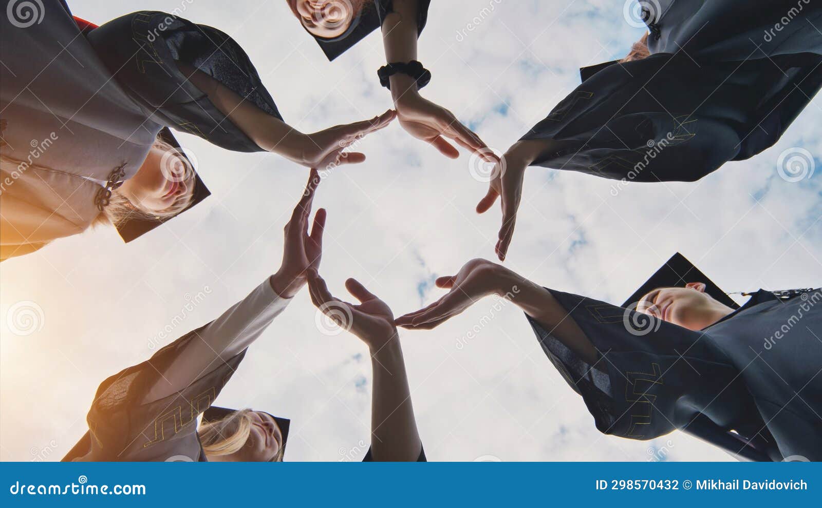 College Graduates Make a Circle of Their Hands. Stock Photo - Image of ...