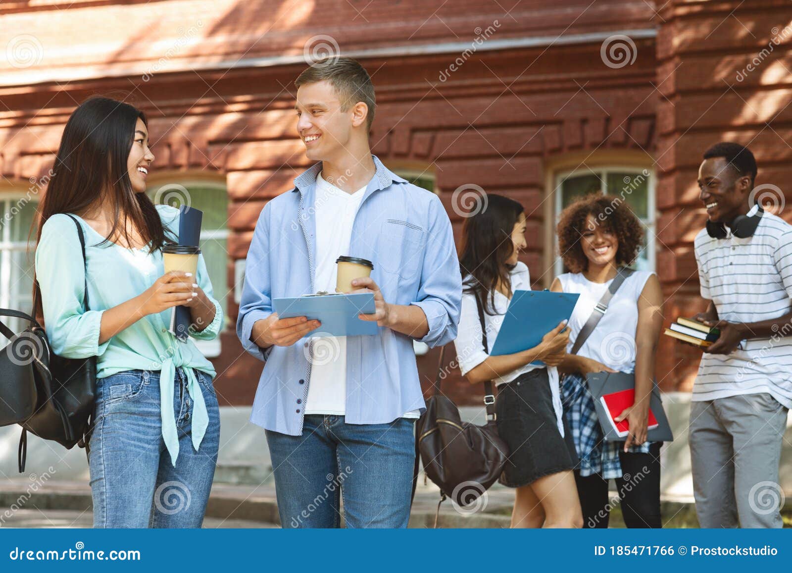 College Life. Joyful Students Chatting Outdoors during Break in Classes ...