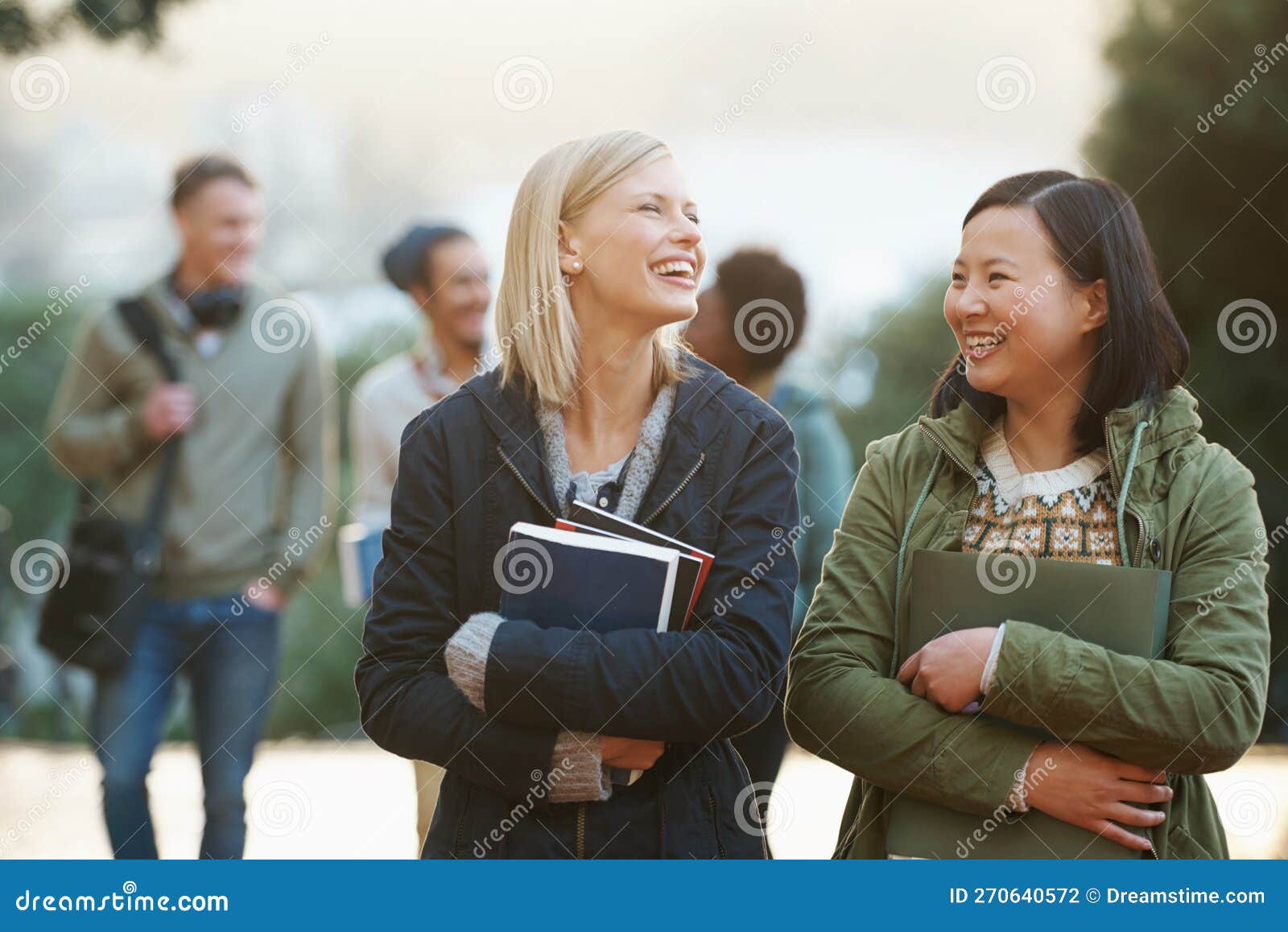 College Life. Shot of a College Students between Classes on the Campus ...