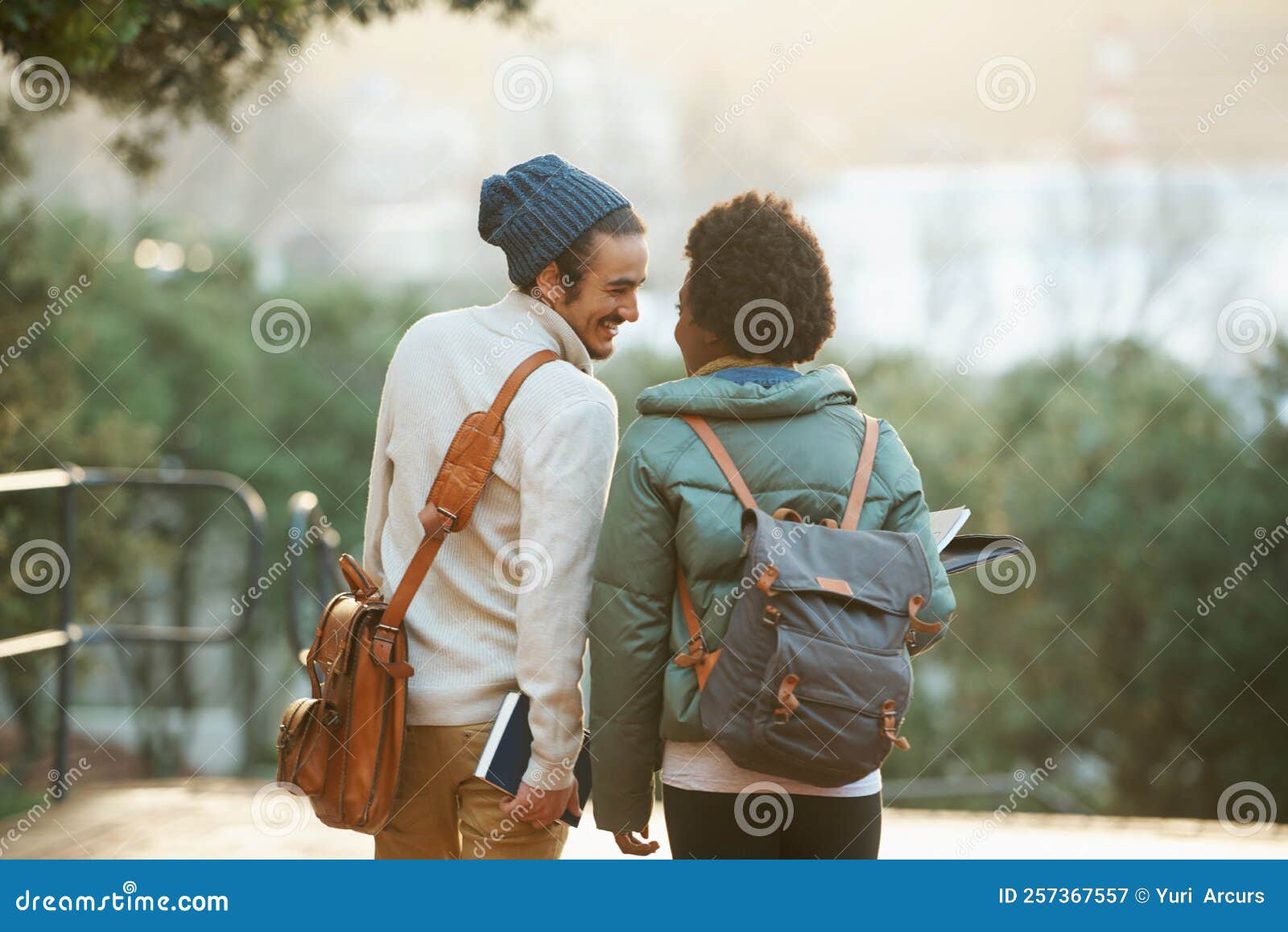 College Life. a College Students between Classes on the Campus Grounds ...