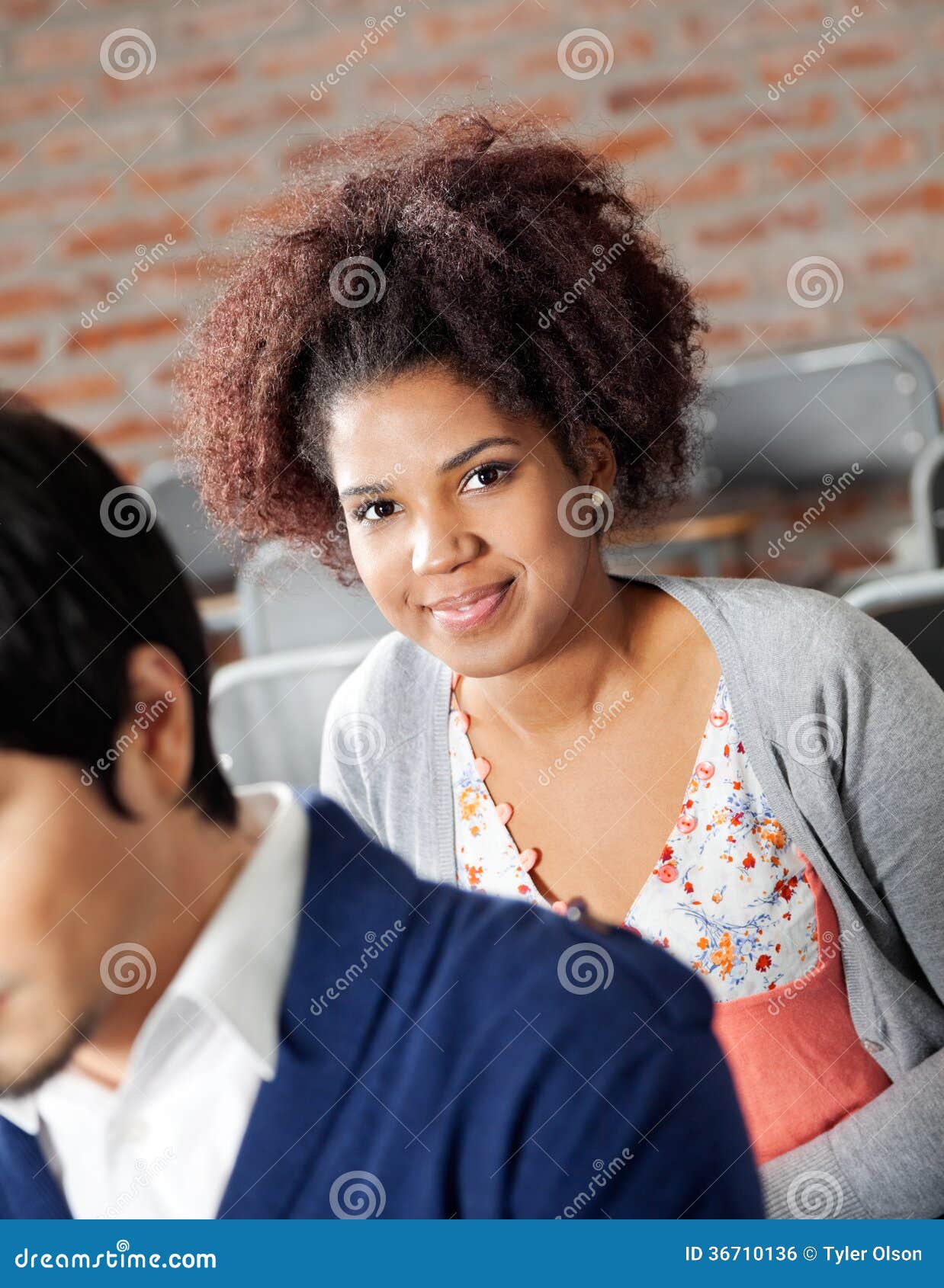 College Student with Classmate in Classroom Stock Photo - Image of ...