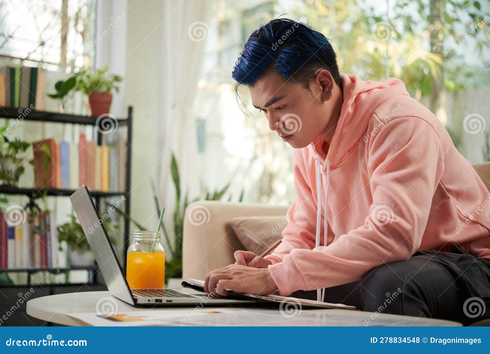 College Student Doing Homework Stock Photo - Image of serious ...