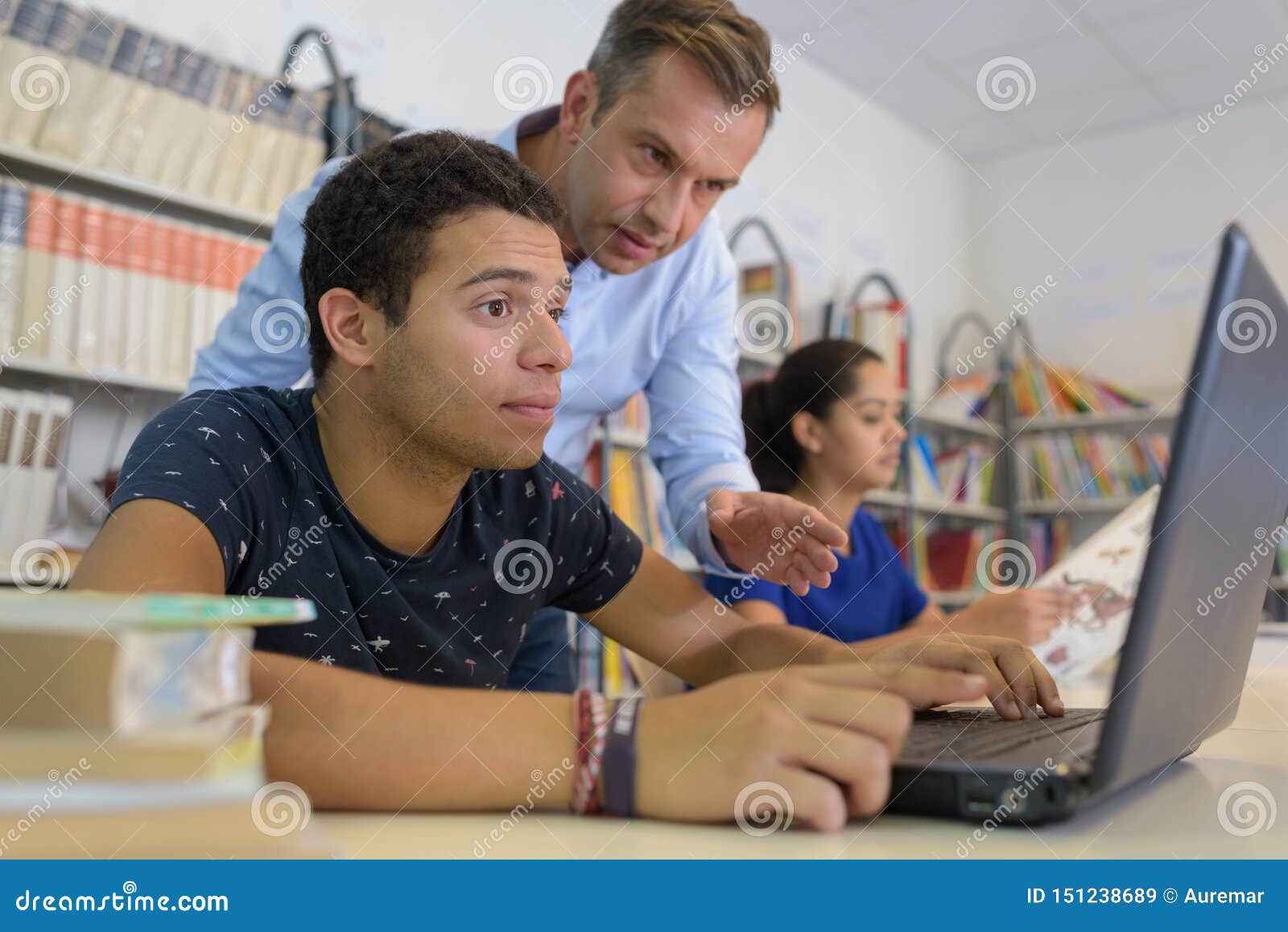 College Student Has Individual Tuition from Teacher in Library Stock ...