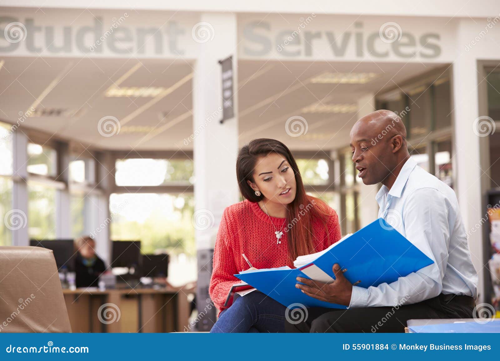 College Student Having Meeting with Tutor To Discuss Work Stock Photo ...