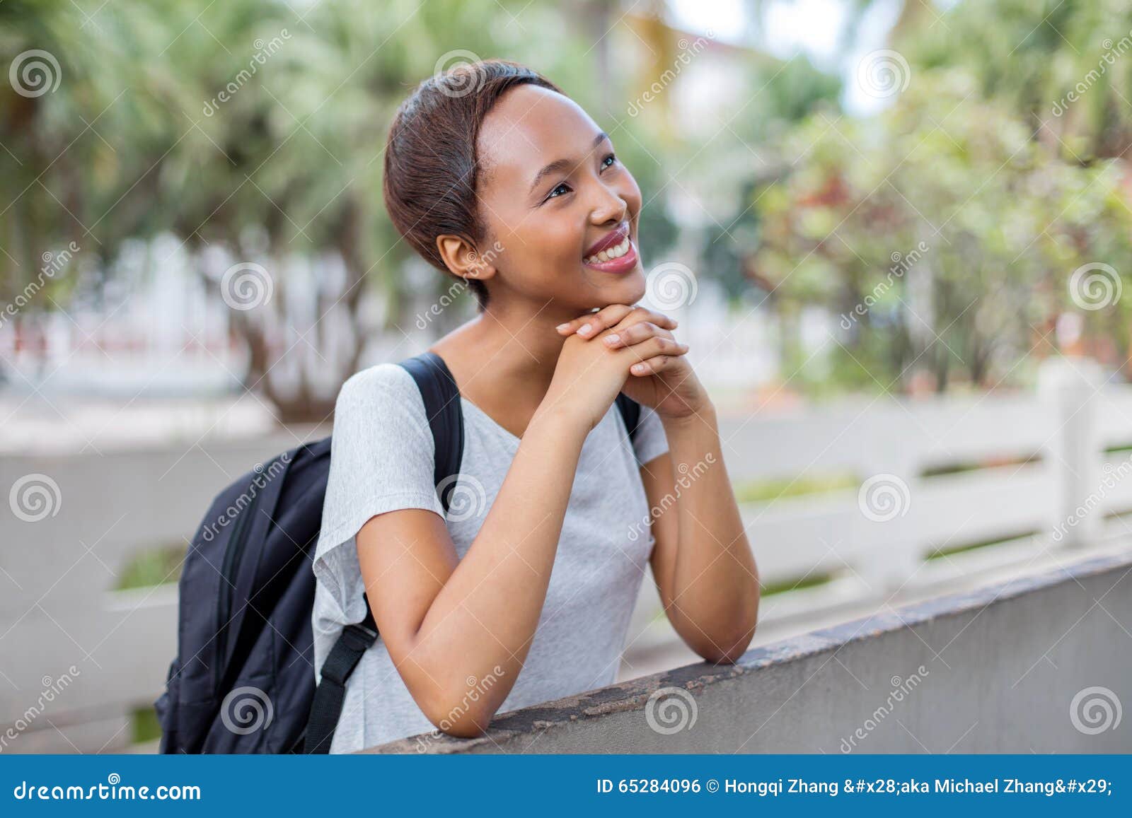 College student looking up stock photo. Image of adult - 65284096