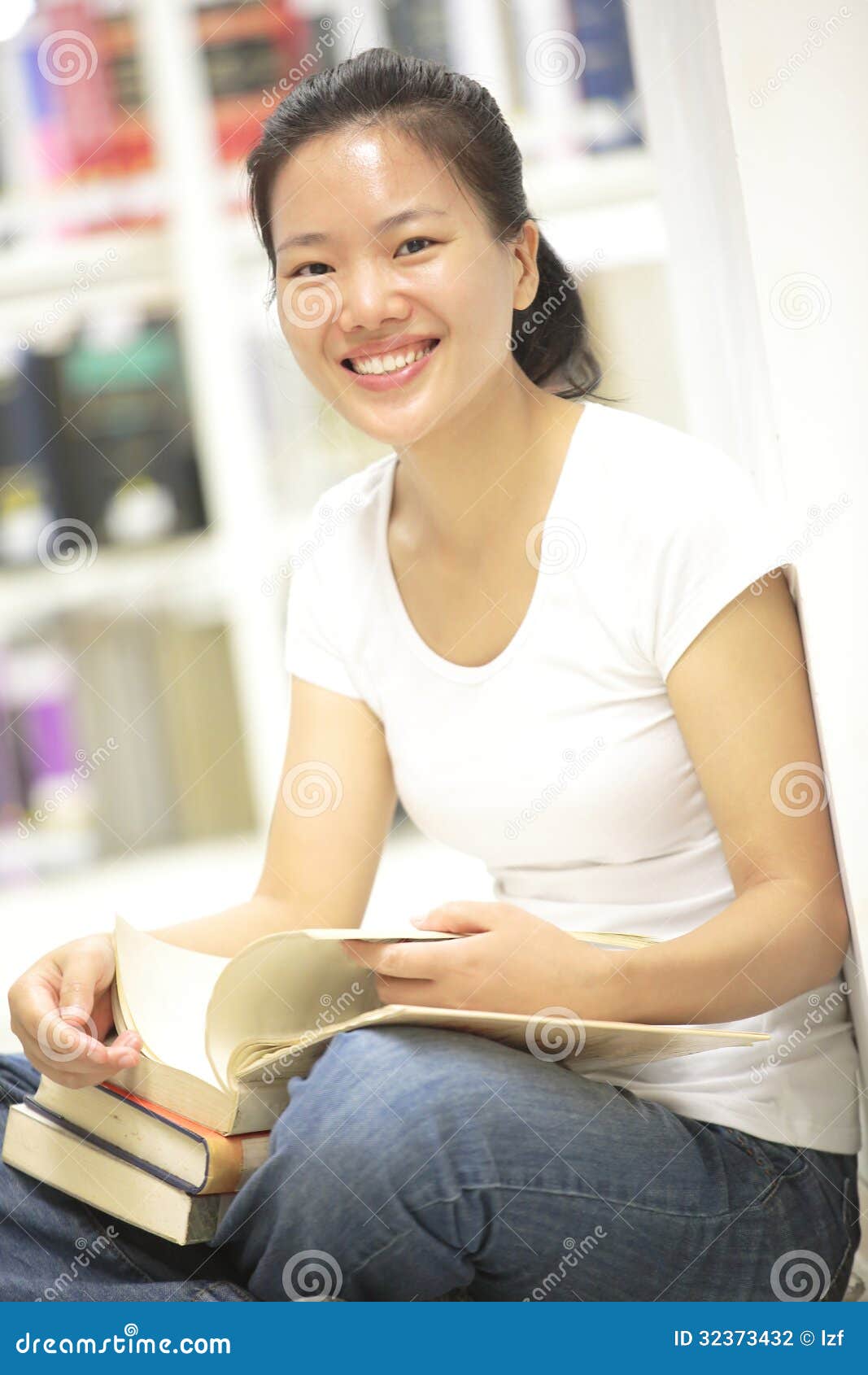 College Student Reading in Libray Stock Photo - Image of college ...