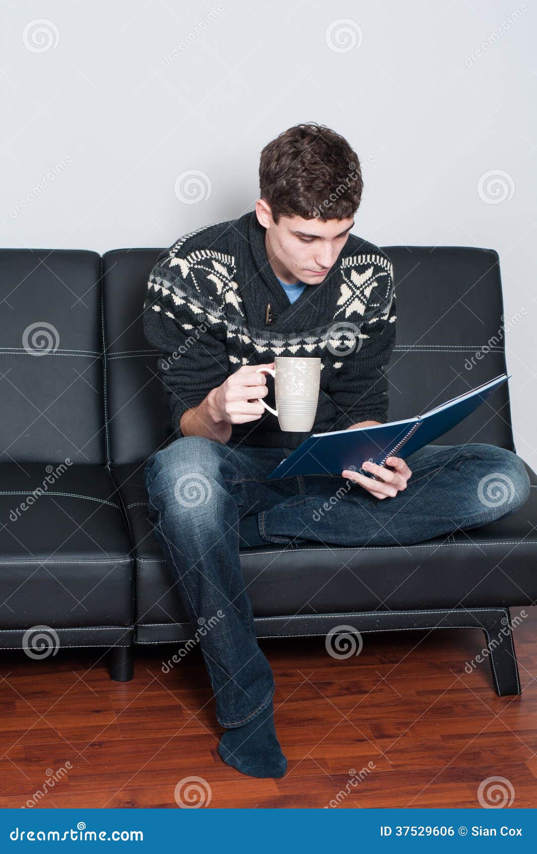 College Student Relaxing Drinking Tea and Reading Stock Photo - Image ...