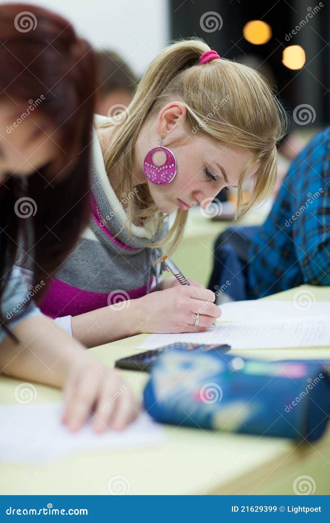 College Student Sitting in a Classroom Stock Image - Image of classroom ...