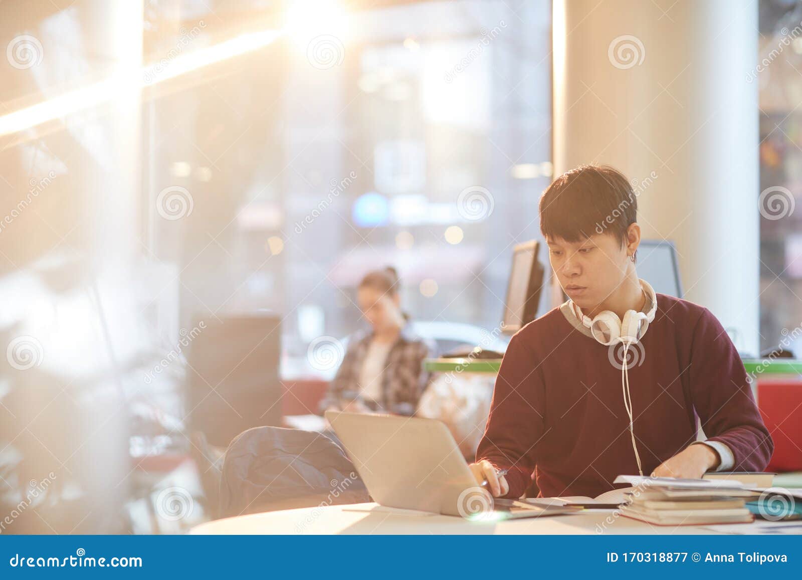 College Student Using Laptop Stock Image - Image of headphones ...