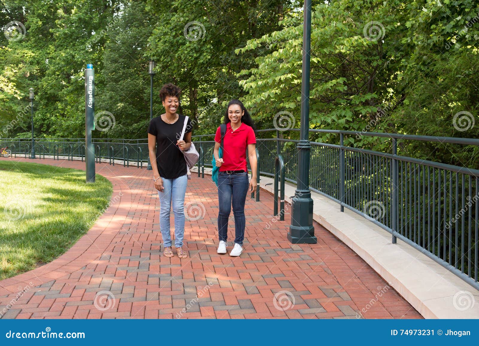 A College Student Walking on Campus Stock Image - Image of attractive ...