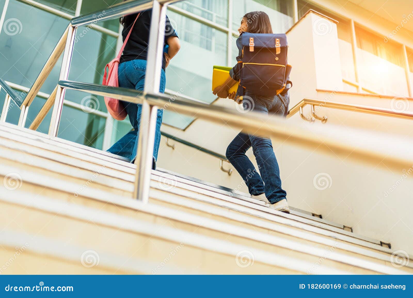 College Student Walking Up the Staircase Stock Image - Image of climb ...