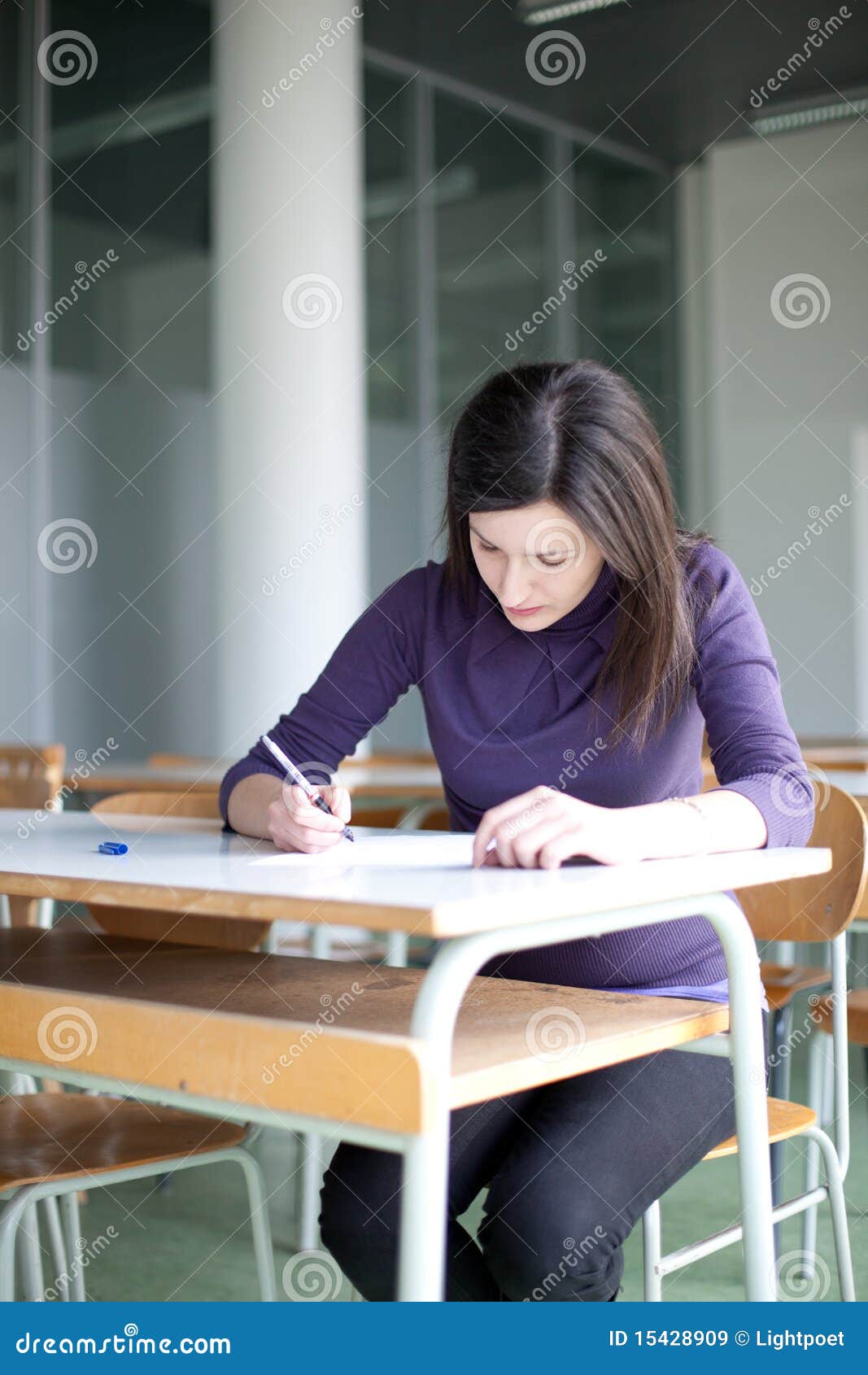 College Student Working in a Classroom Stock Image - Image of confident ...