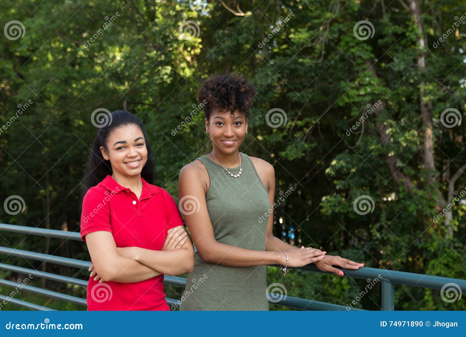 2 College Students on Campus Stock Photo - Image of outdoors, cheerful ...